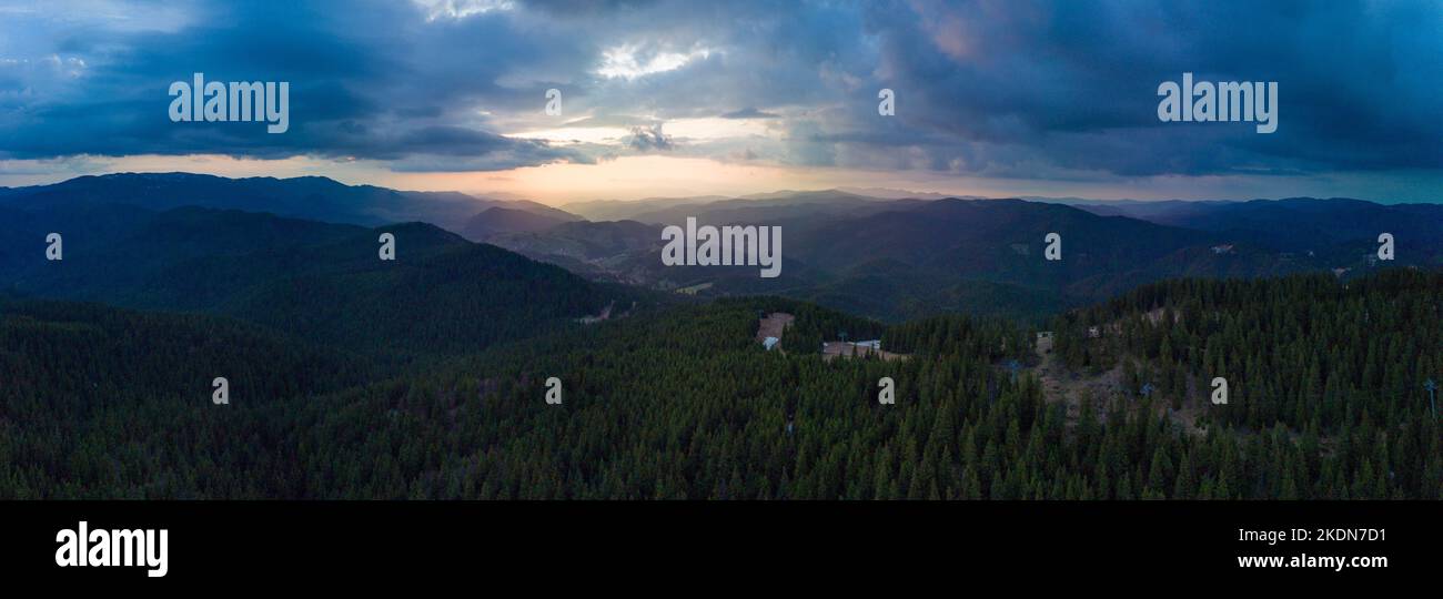 Valley of Balkan mountains is covered with fog, sunny clouds and ...