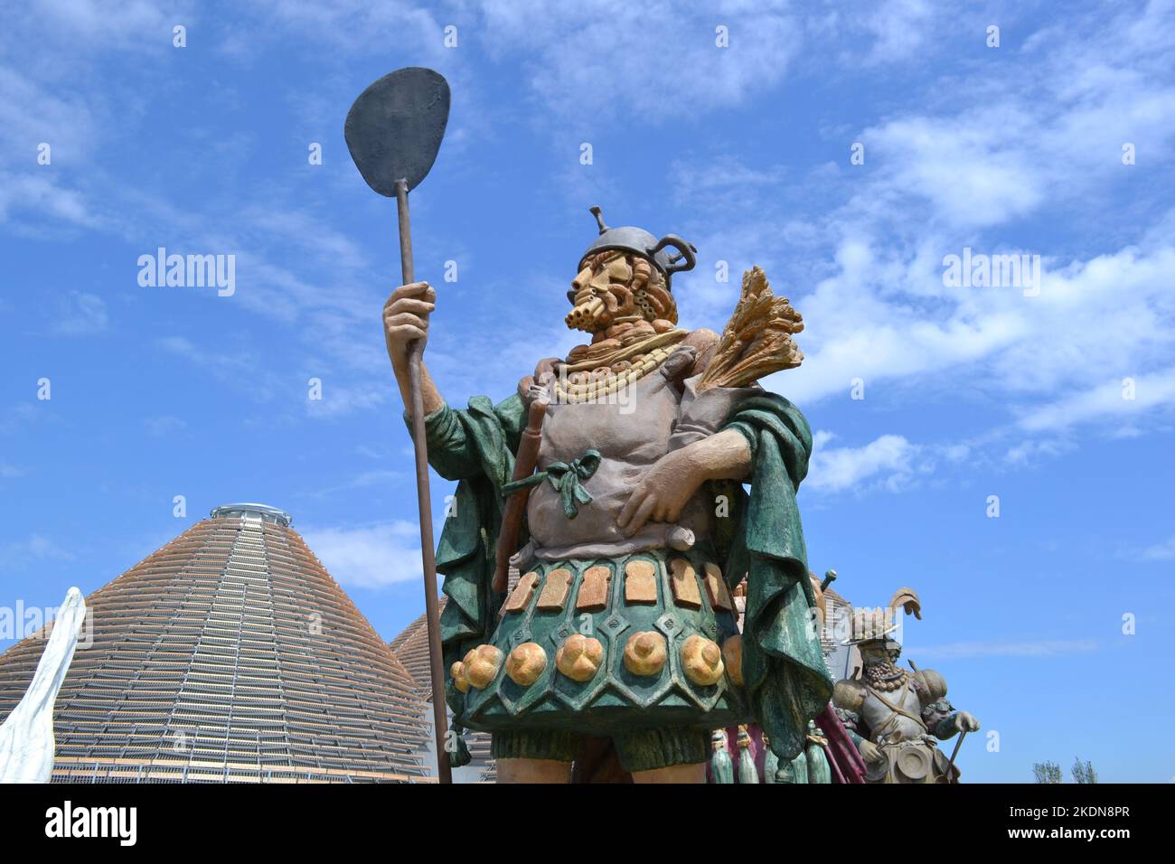 Statue of Fornaro - baker standing in a group of statues of The Food ...