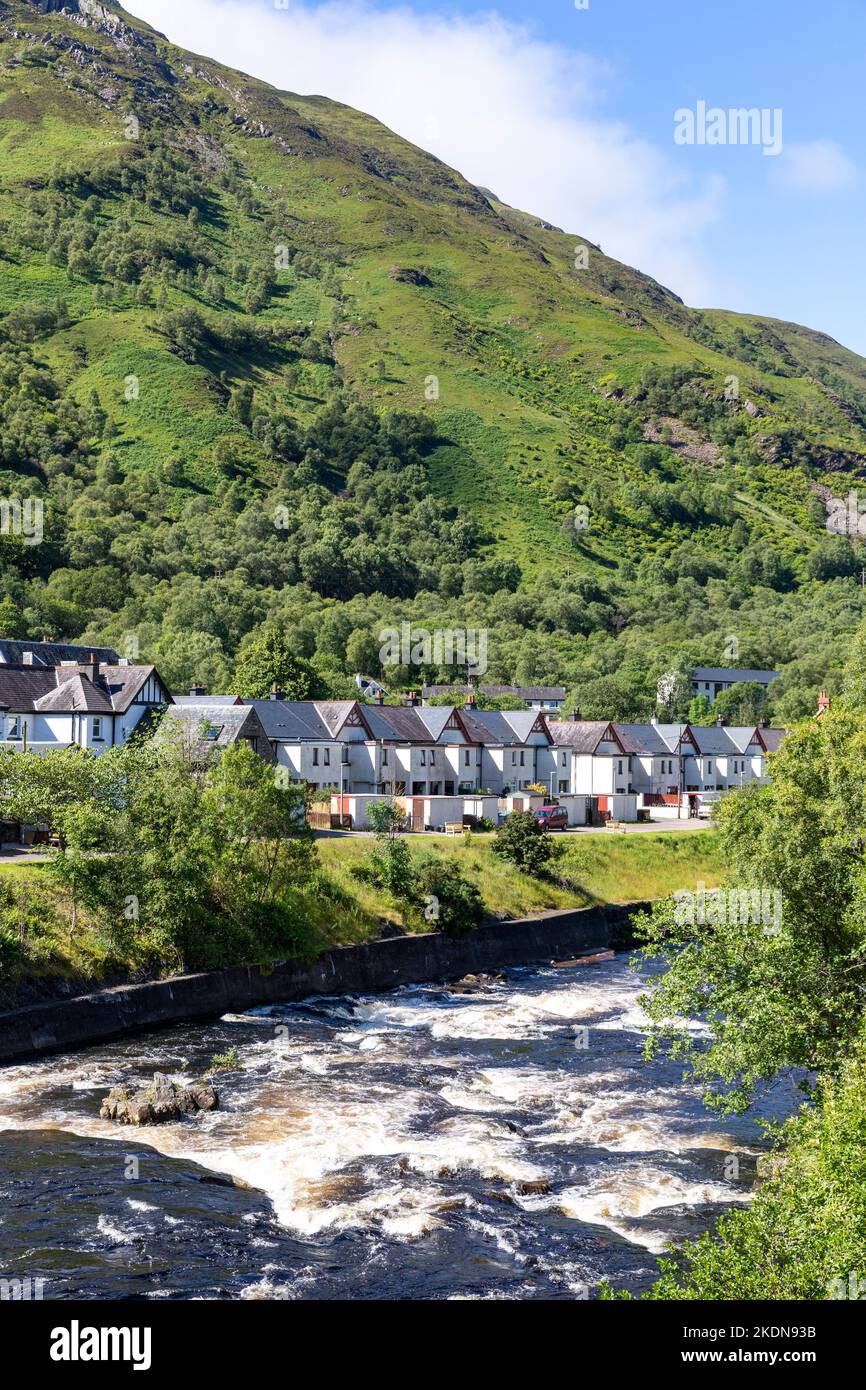 River Leven flowing through the village of Kinlochleven near Glencoe on ...