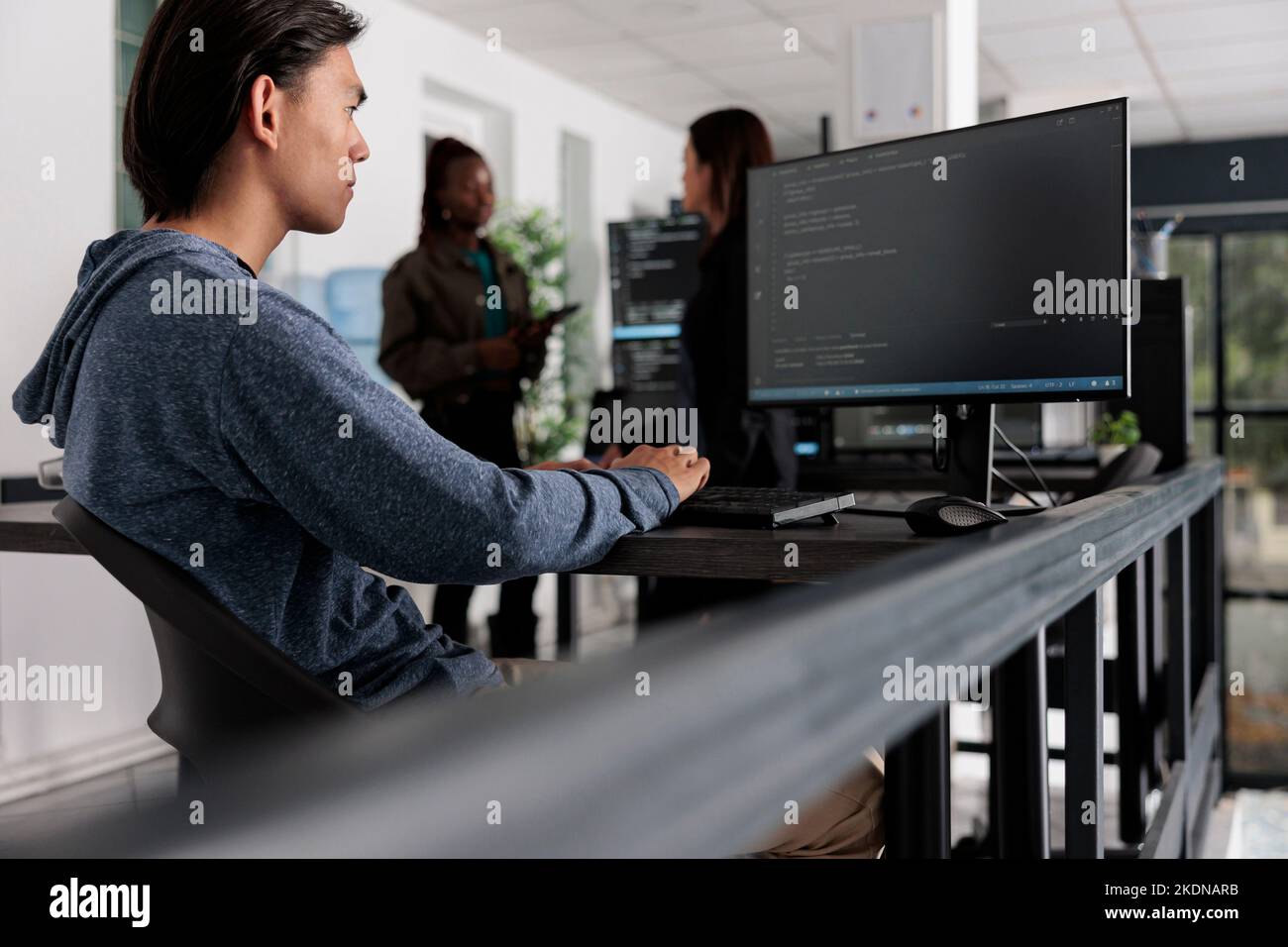 Asian Programmer Analyzing Compiling Html Code On Computer Display Working On Interface