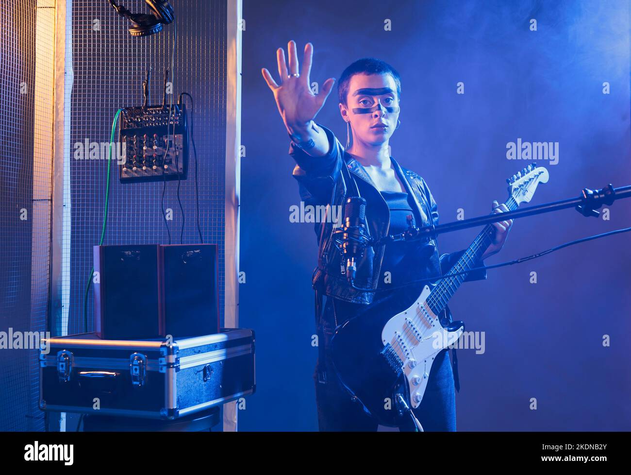Female performer showing stop sign with palm, doing serious break ...
