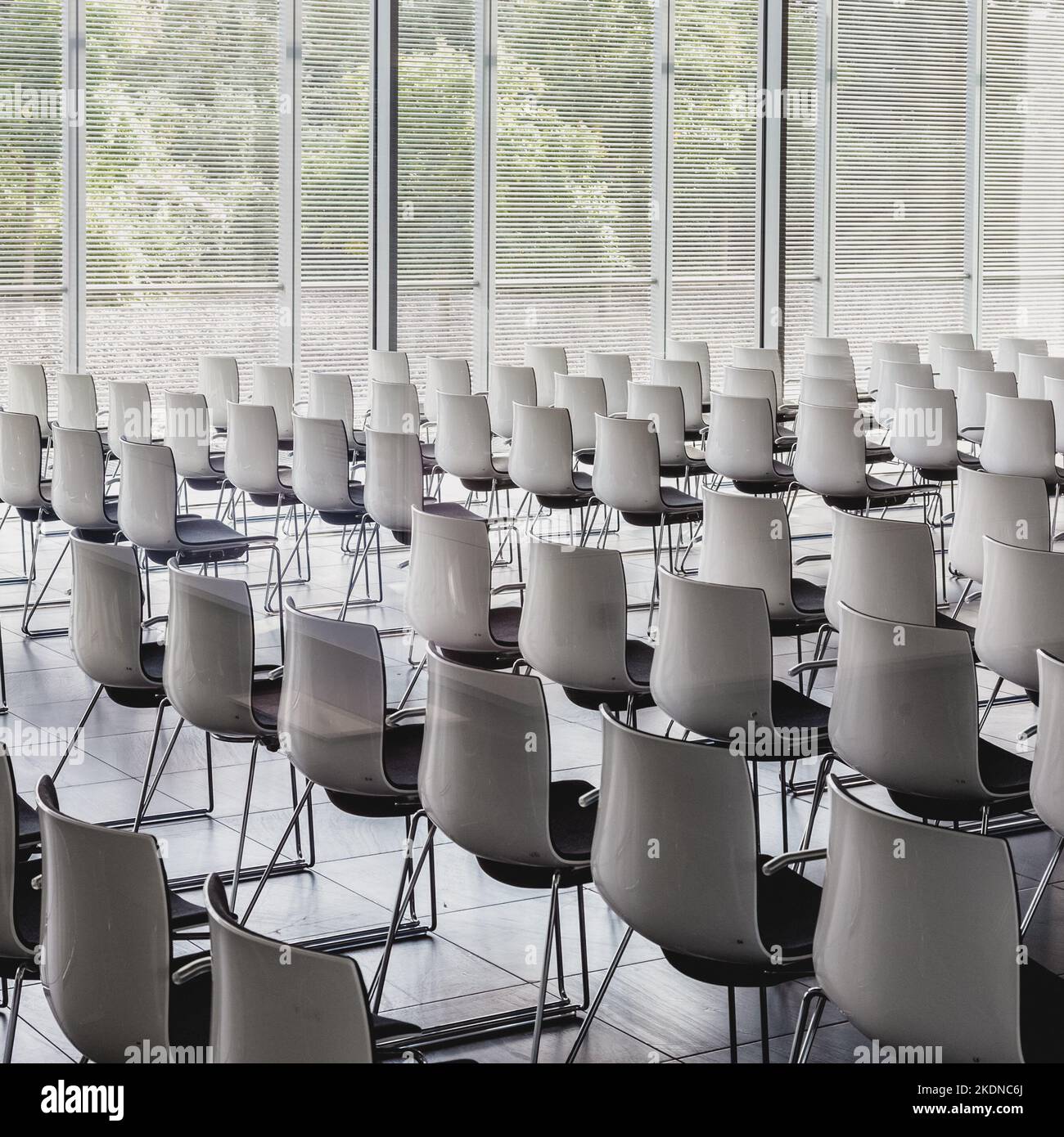 Interior of empty contemporary conference hall with white chairs Stock ...