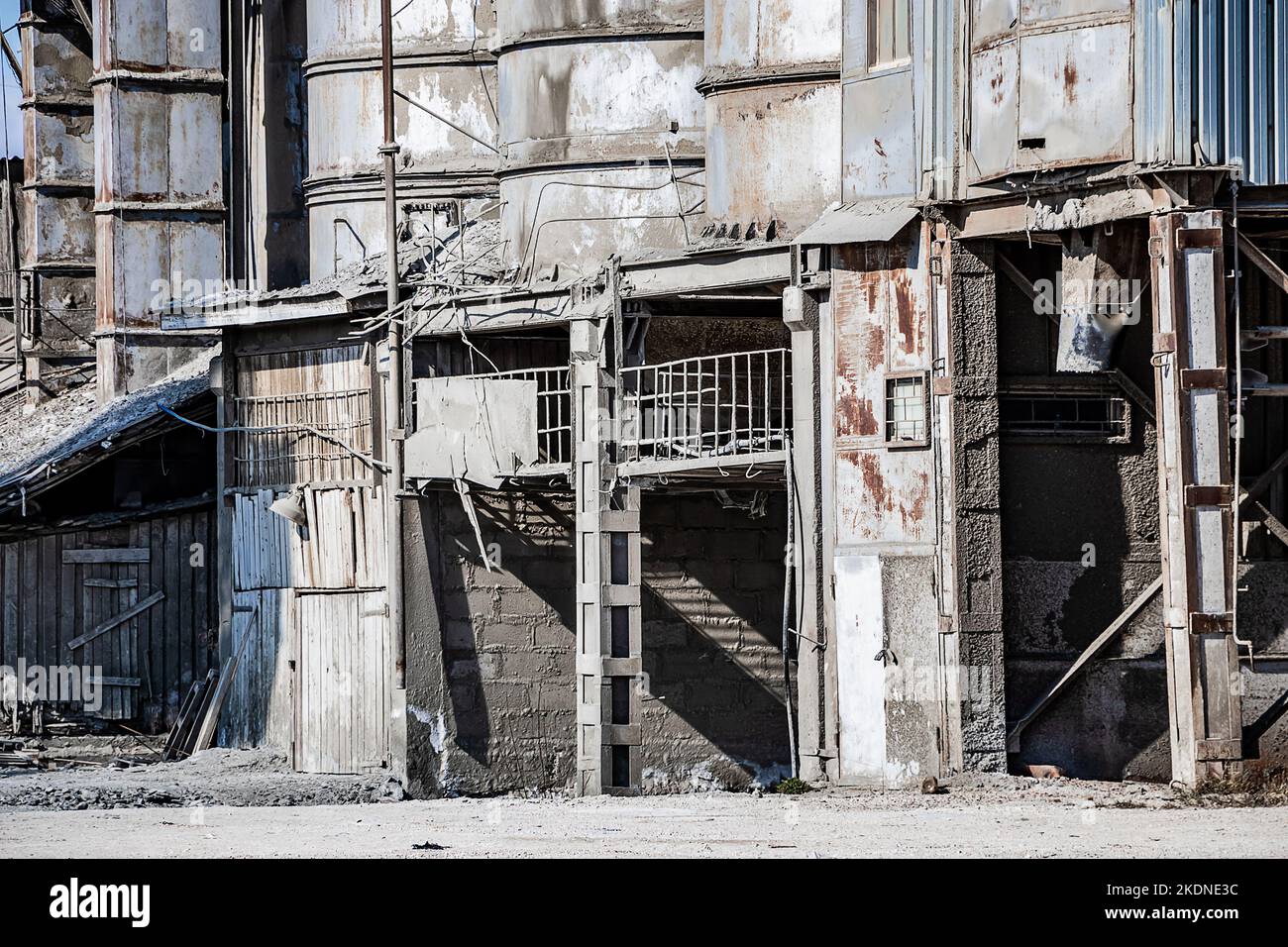 Old destroyed construction site. Rusty scaffolding and construction ...