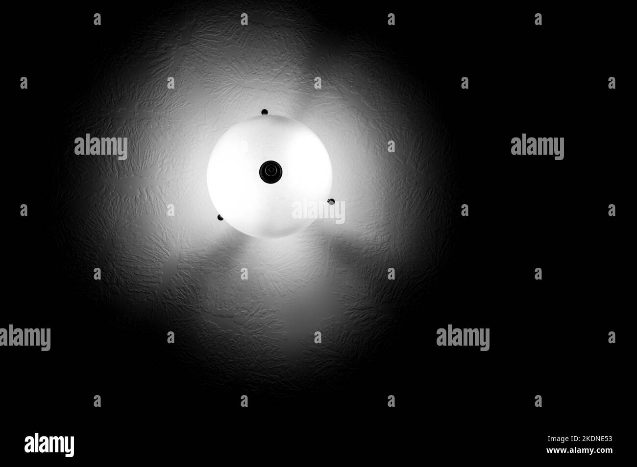 Directly underneath a modern light fixture looking up Stock Photo - Alamy