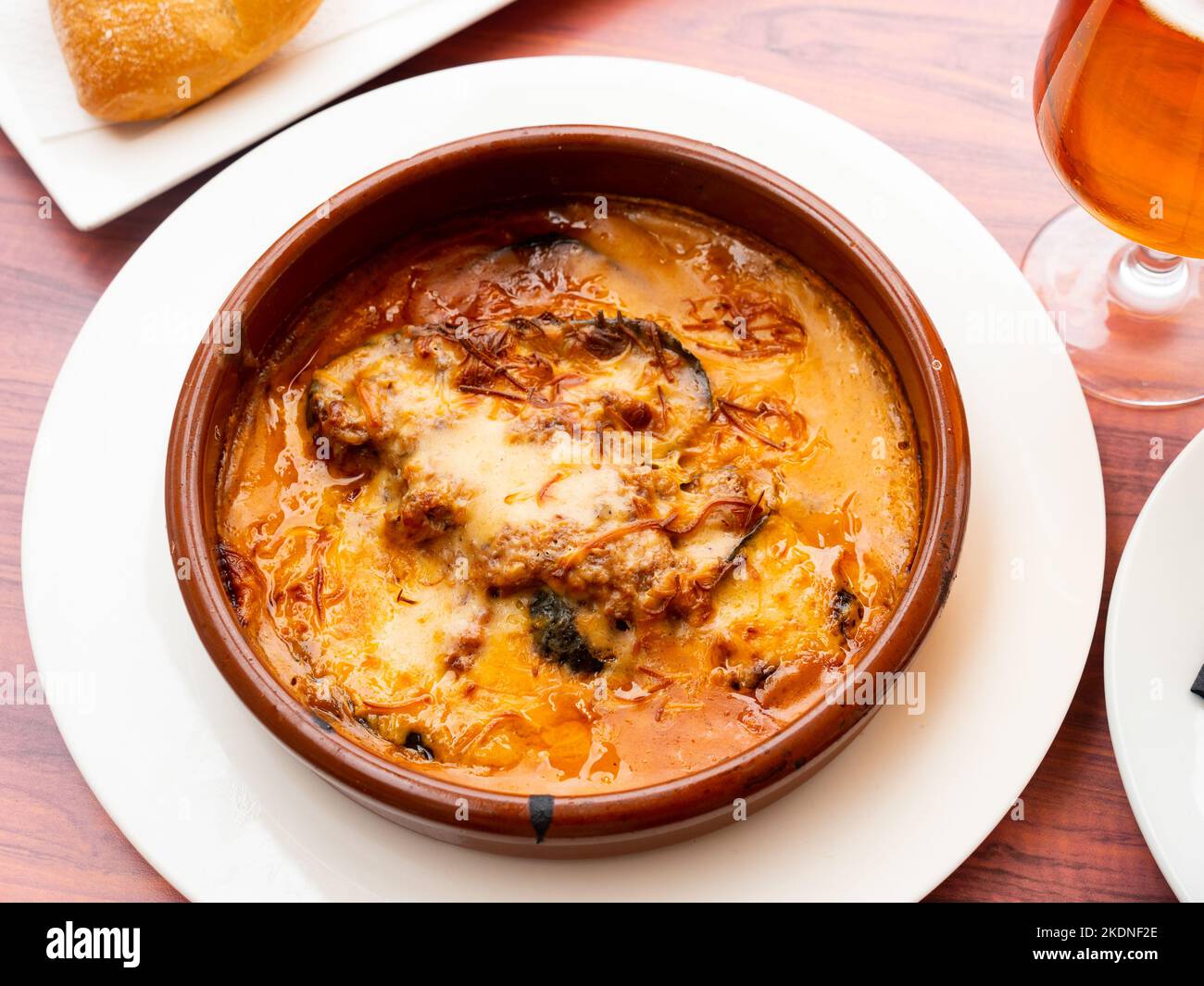 Traditional baked Balkan moussaka with aubergines and minced meat Stock ...