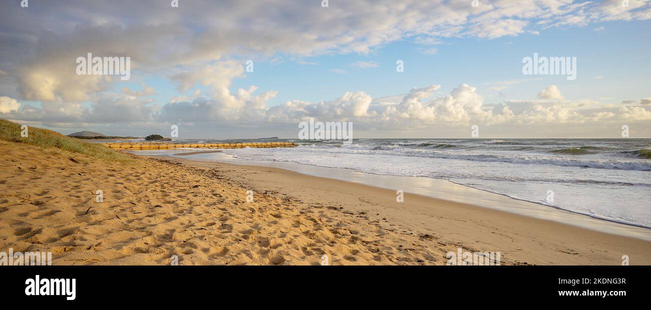 Early morning at Cotton Tree beach showing cloudy sky, surf waves ...