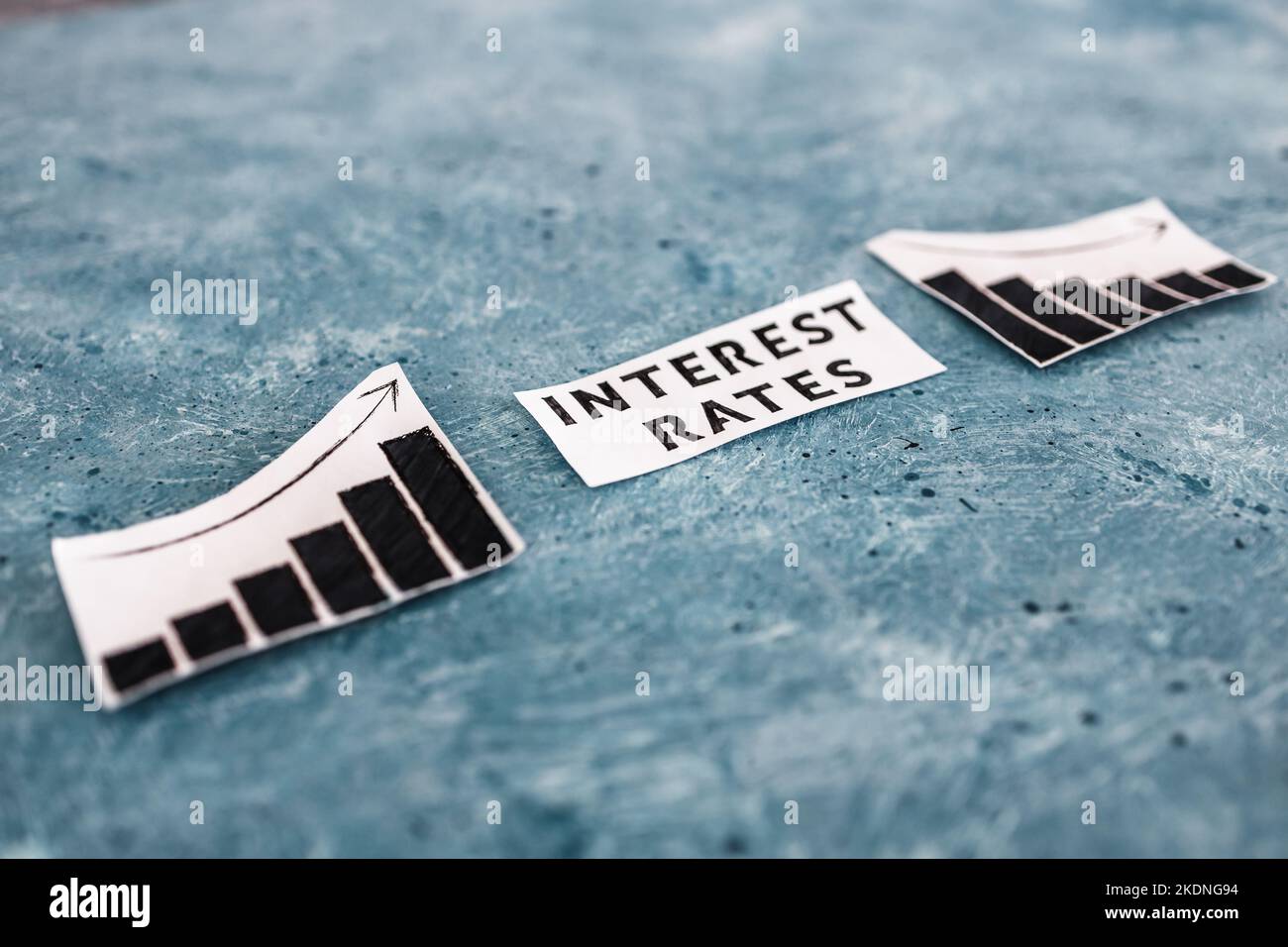 interest rates text in between graphs with stats going up then going ...