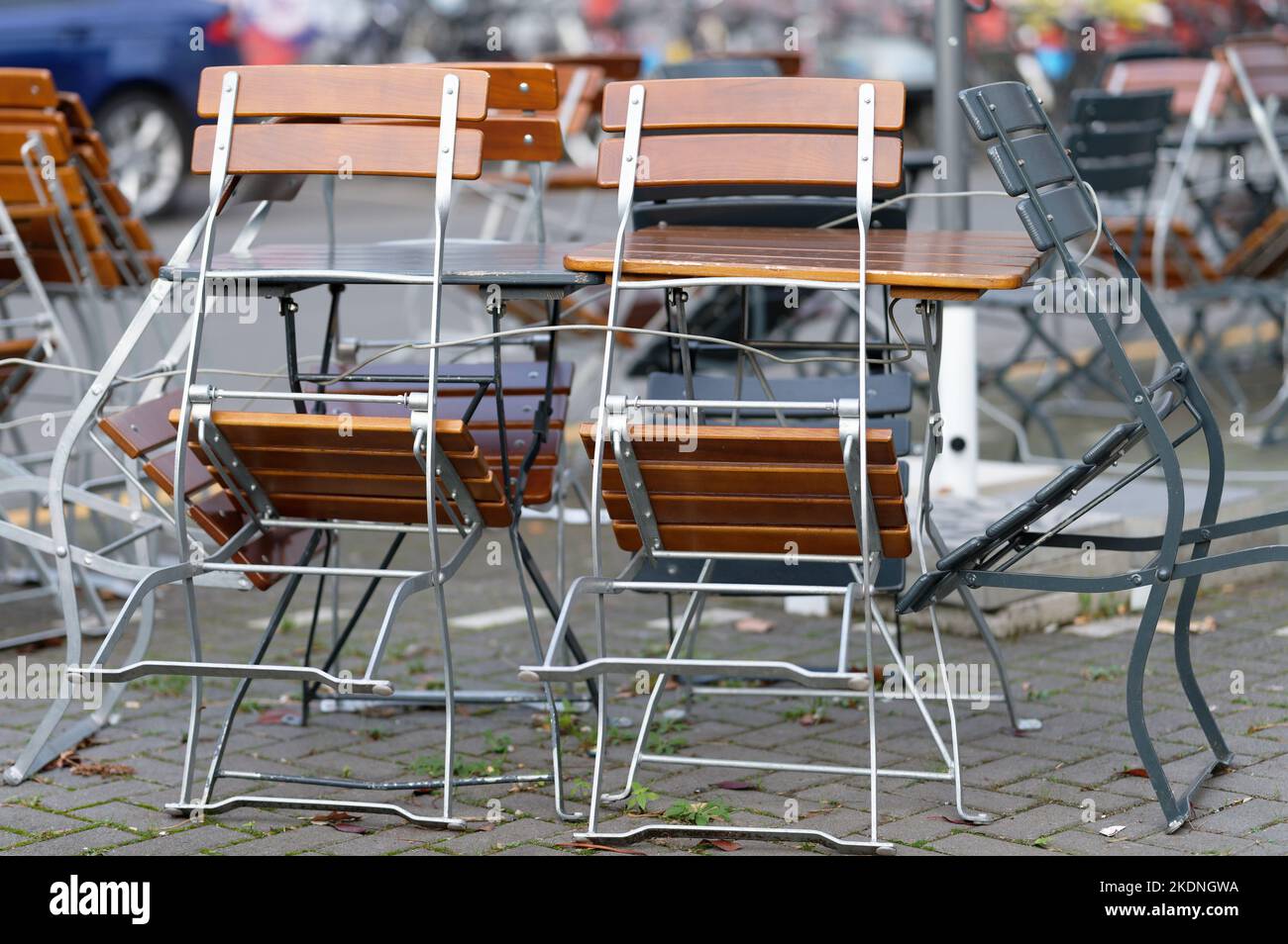 tables and chairs of the outdoor catering of a restaurant on the ...