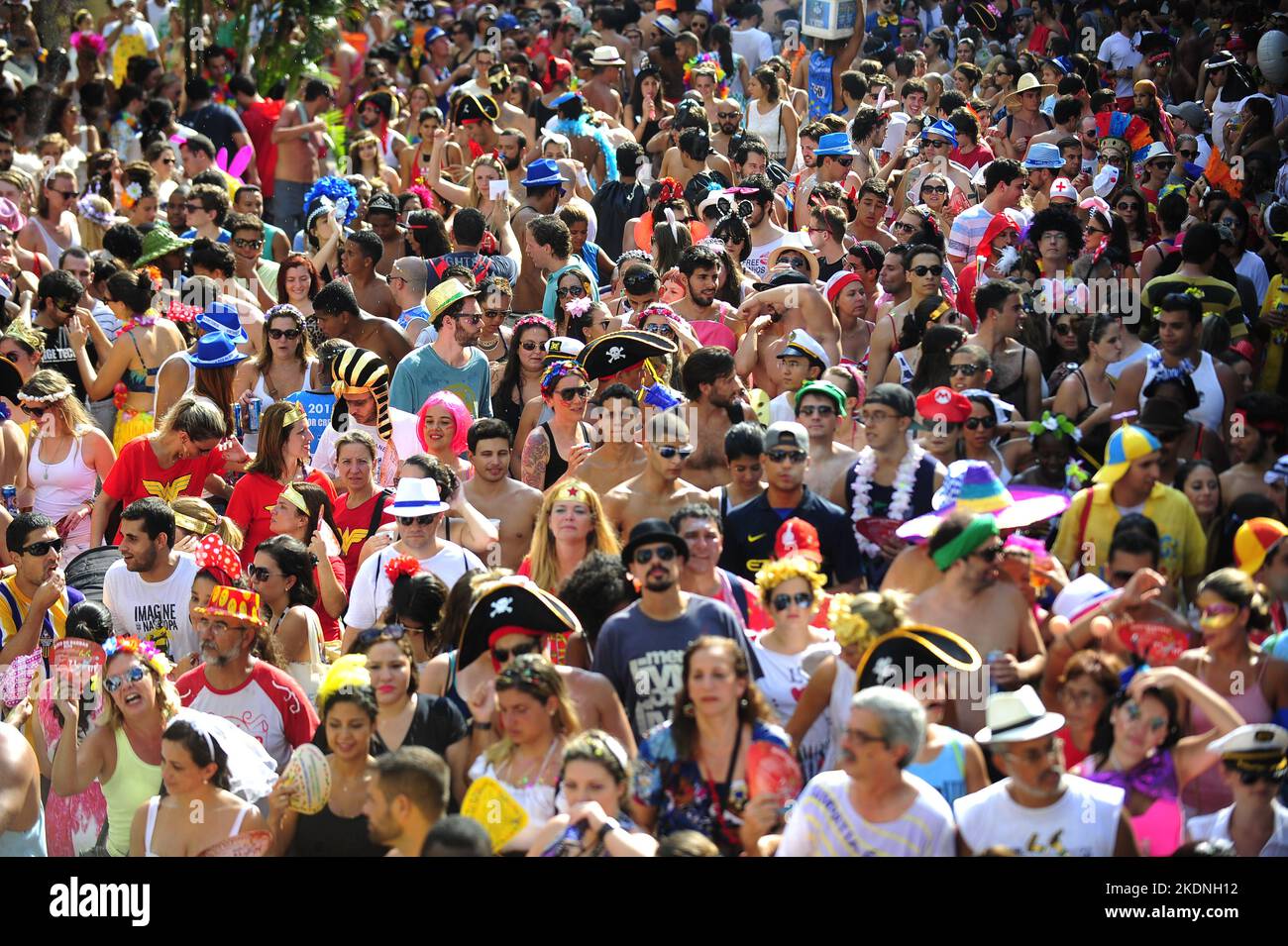 Crowd of people partying at street brazilian carnival parade. Overview ...