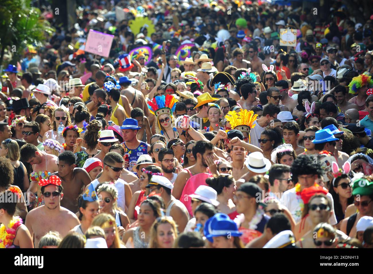 Crowd of people partying at street brazilian carnival parade. Overview ...