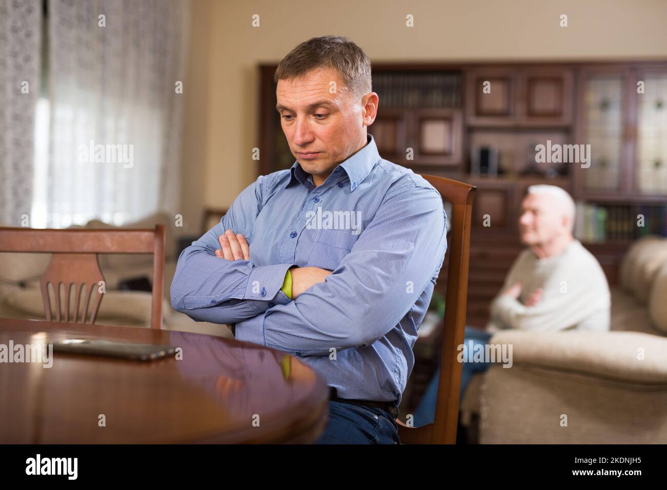 Man having problems in relationship with father Stock Photo - Alamy