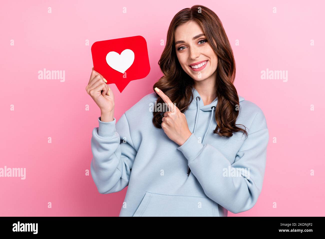 Photo of pretty positive lady indicate finger paper like card isolated ...