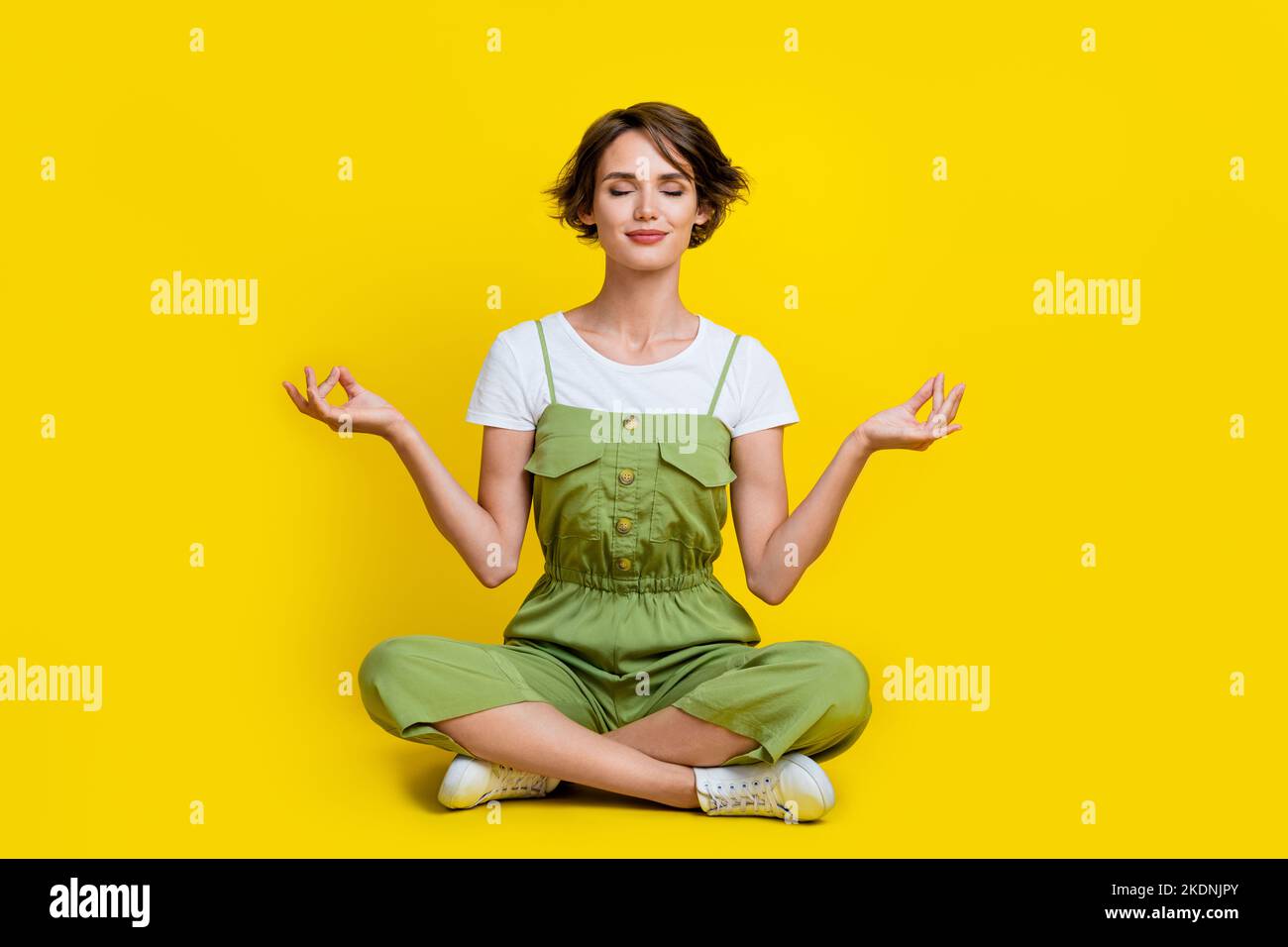 Full size photo of lovely young woman practice meditate lotus pose ...