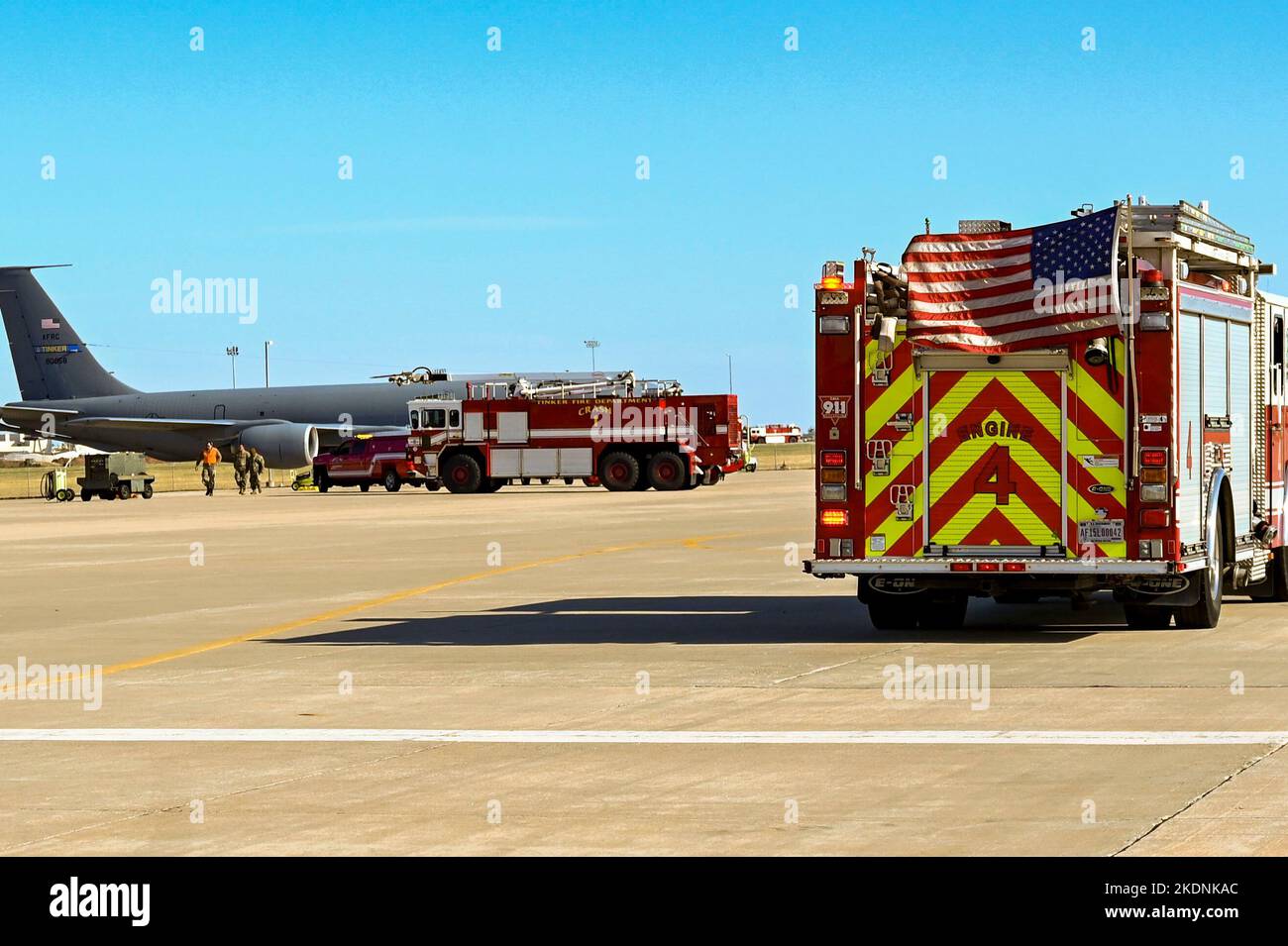 Two 507th Civil Engineering Squadron firetrucks sit on the flight line ...