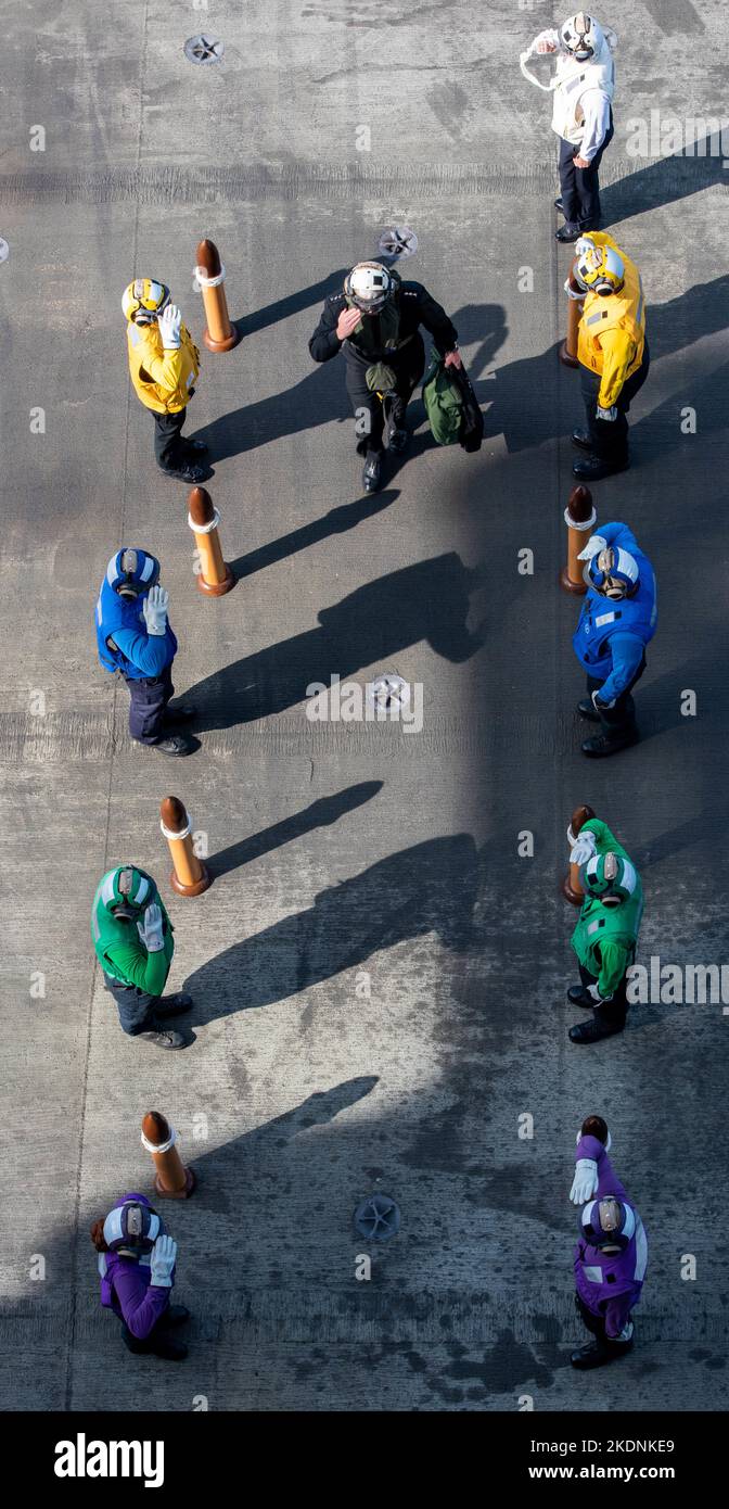 221106-N-UF592-1126 SAGAMI WAN (Nov. 6, 2022) Sideboys render honors to ...