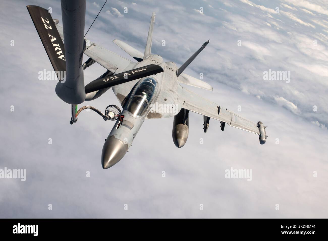 A U.S. Navy F/A-18 Super Hornet receives fuel from a KC-135 ...