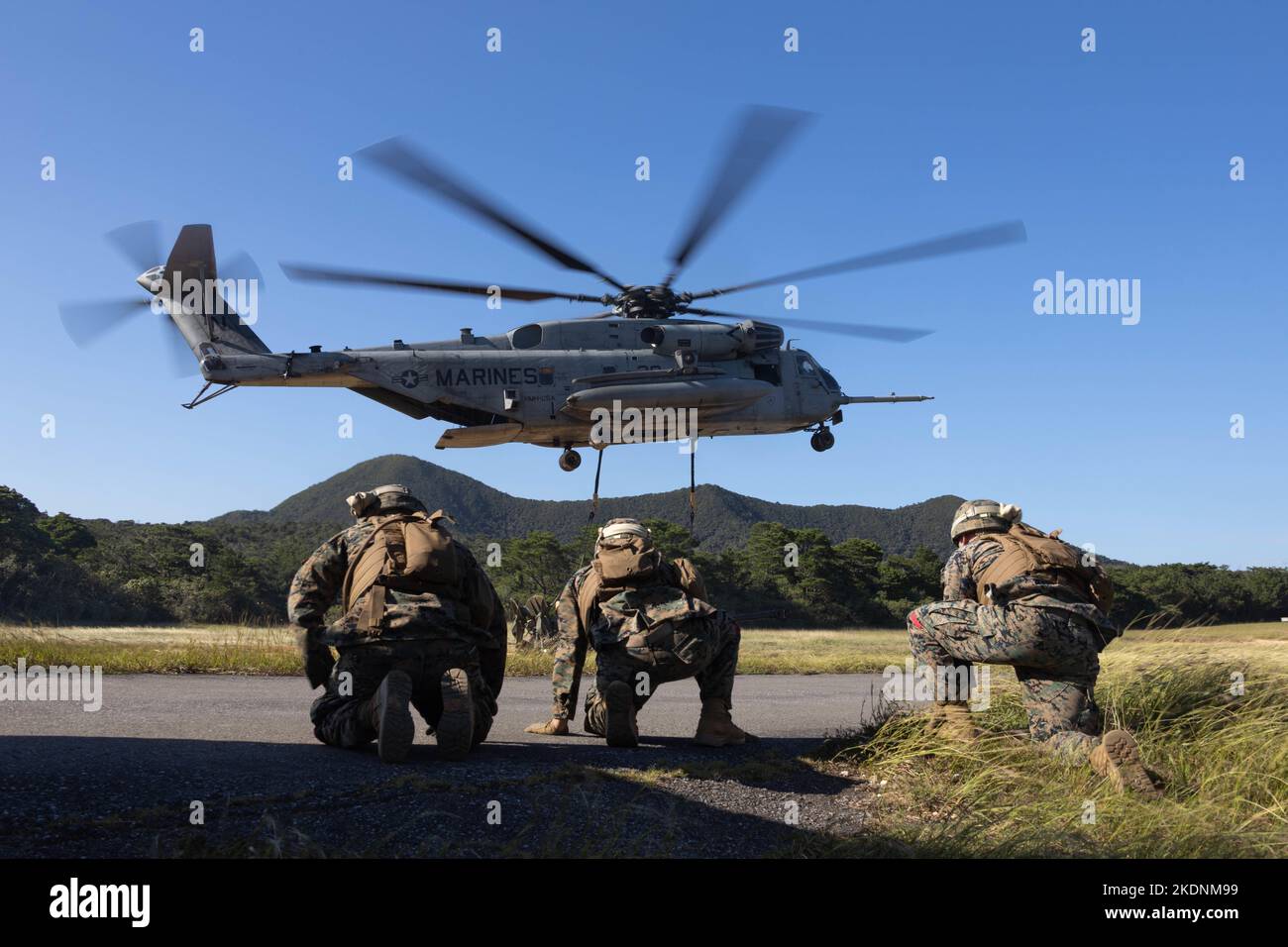 U.S. Marines with 3rd Battalion, 12th Marines prepare to attach an M777 ...