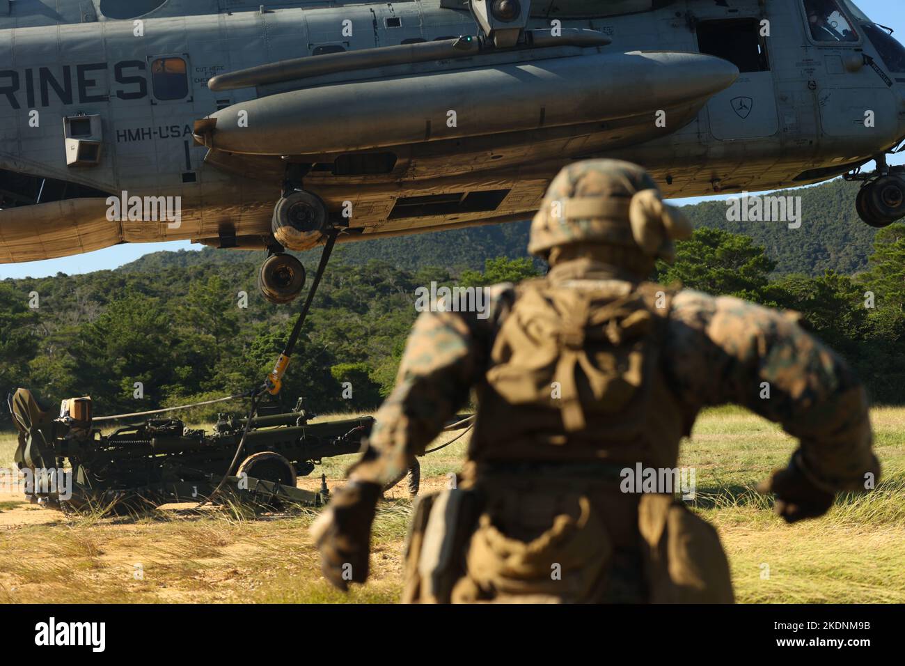 A U.S. Marine Corps CH-53E Super Stallion lifts an M777 Howitzer during ...