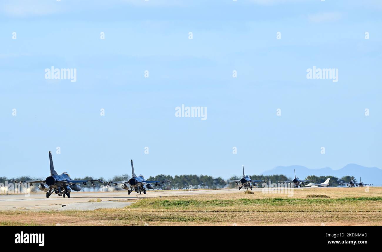 Seven F-16 Fighting Falcons with the 80th Fighter Squadron taxi at ...
