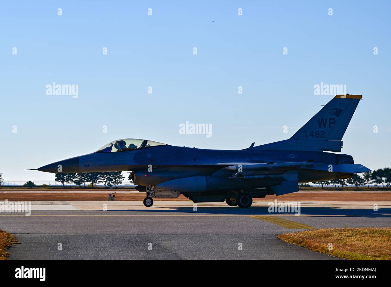 An 80th Fighter Squadron F-16 Fighting Falcon taxis to the runway at ...