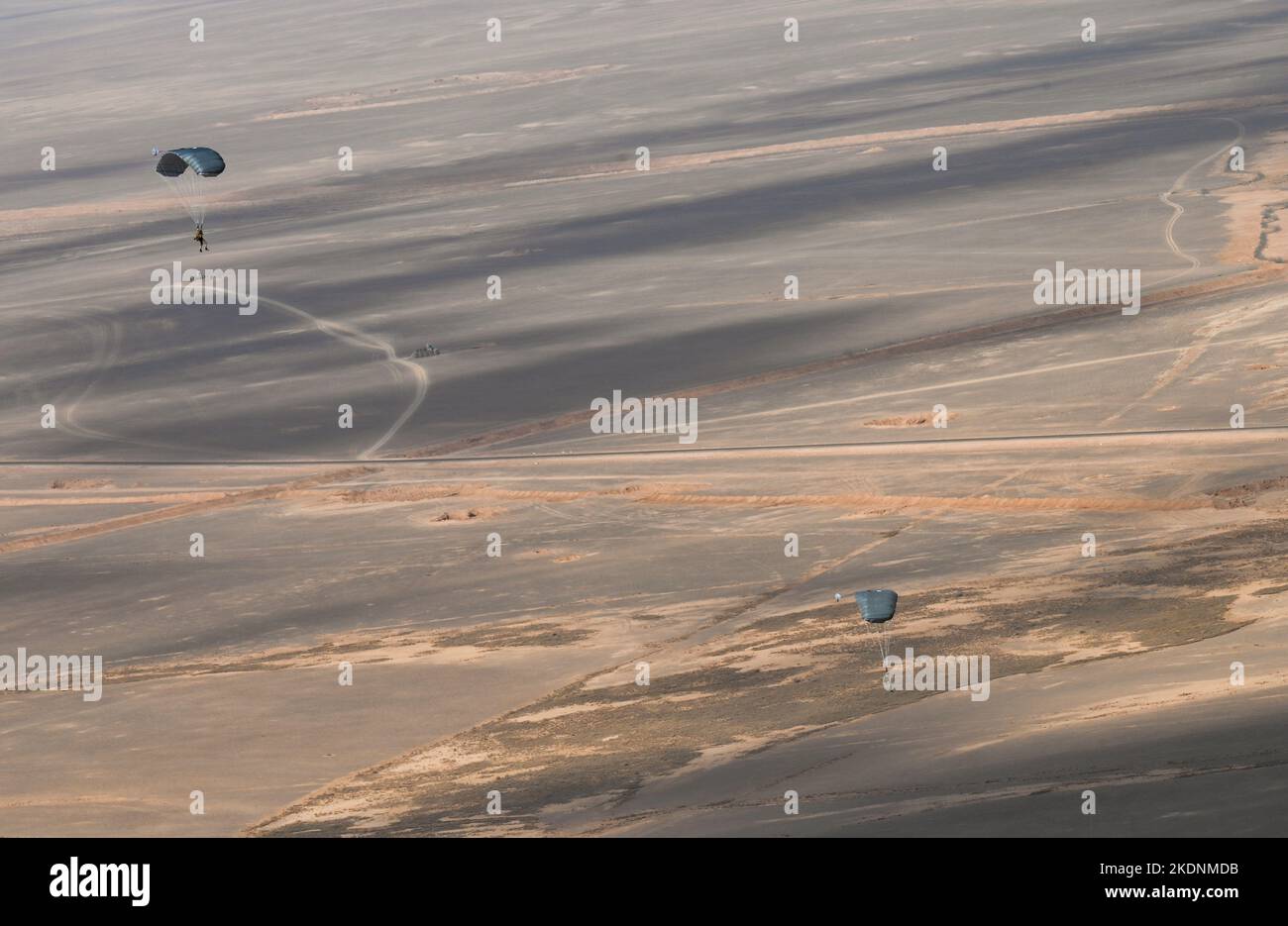 Two U.S. Air Force pararescuemen, assigned to the 52nd Expeditionary ...
