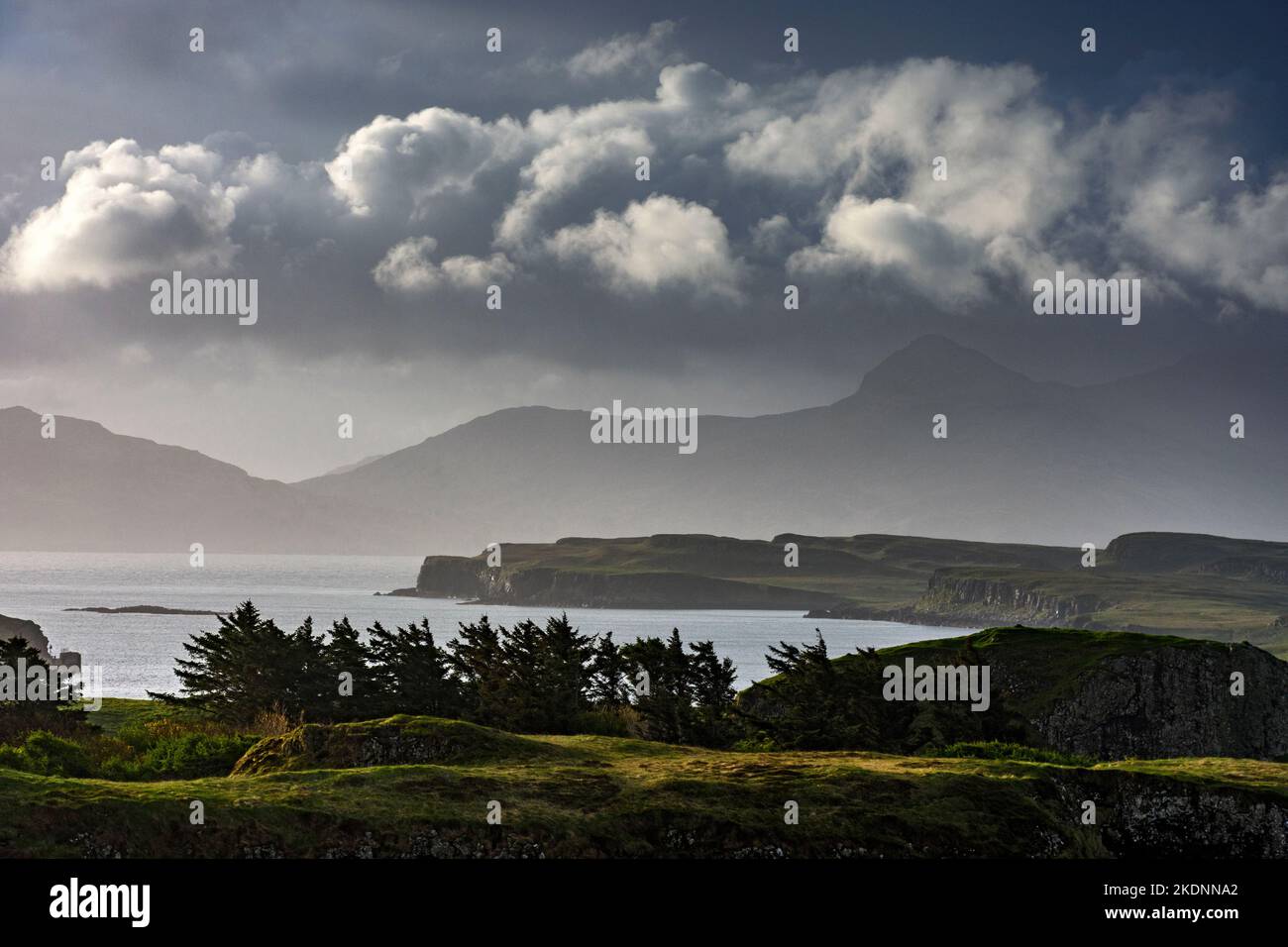 Stormy skies over the Isle of Rum, looking over Canna harbour and the ...