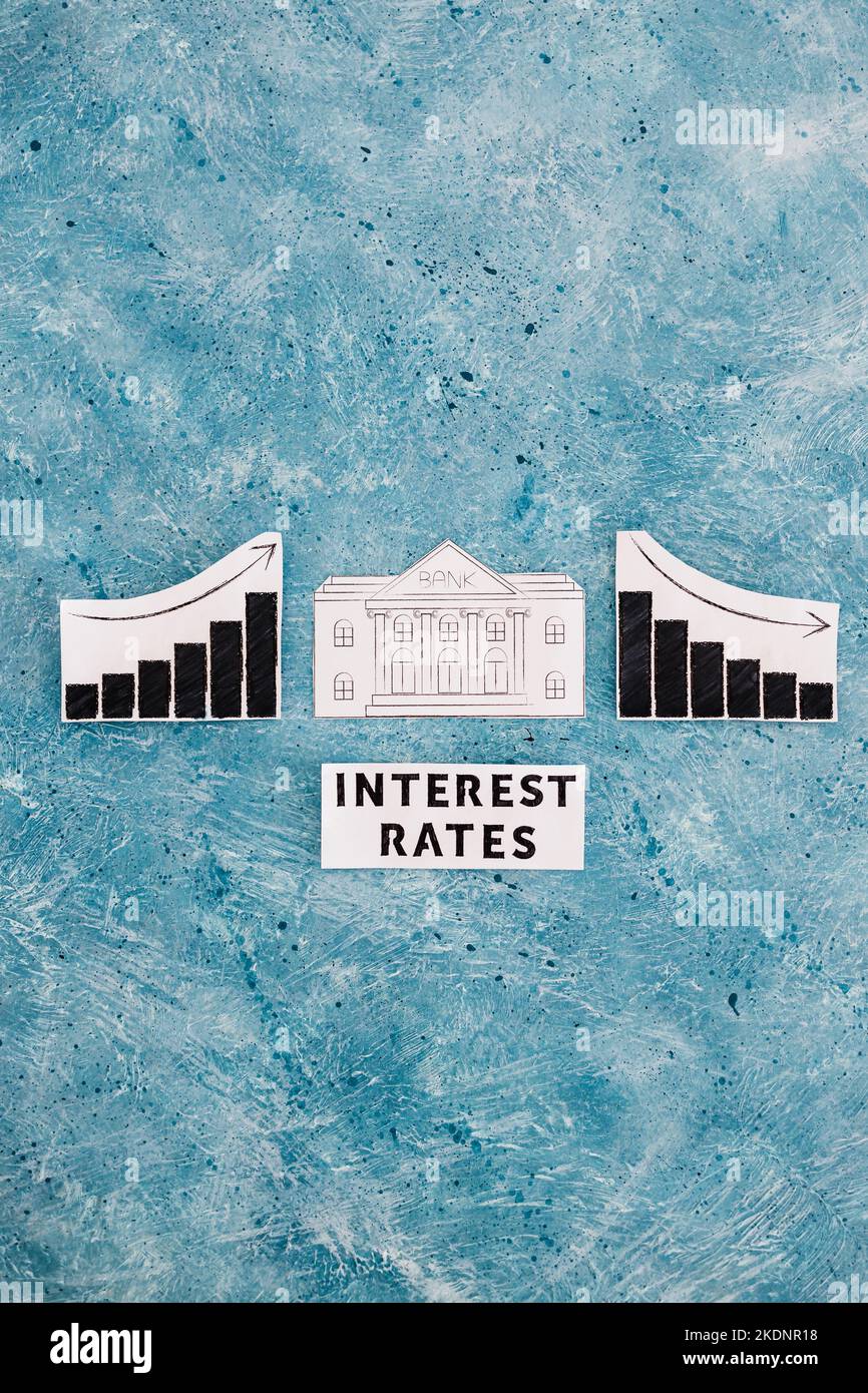 Interest rates text with bank icon in between graphs with stats going ...