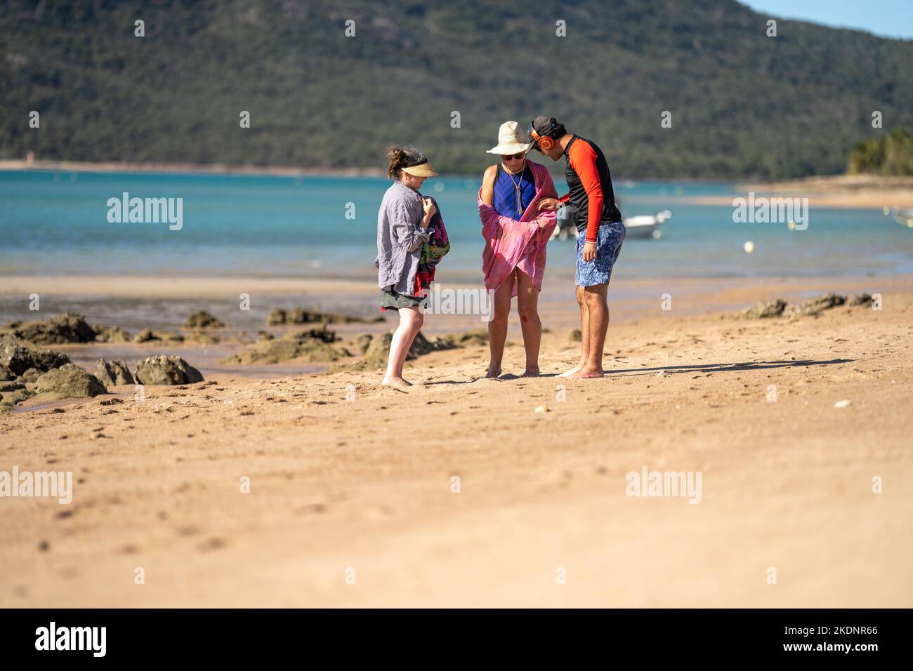 tourists on holiday at a tropical beach in the tropics in summer Stock ...