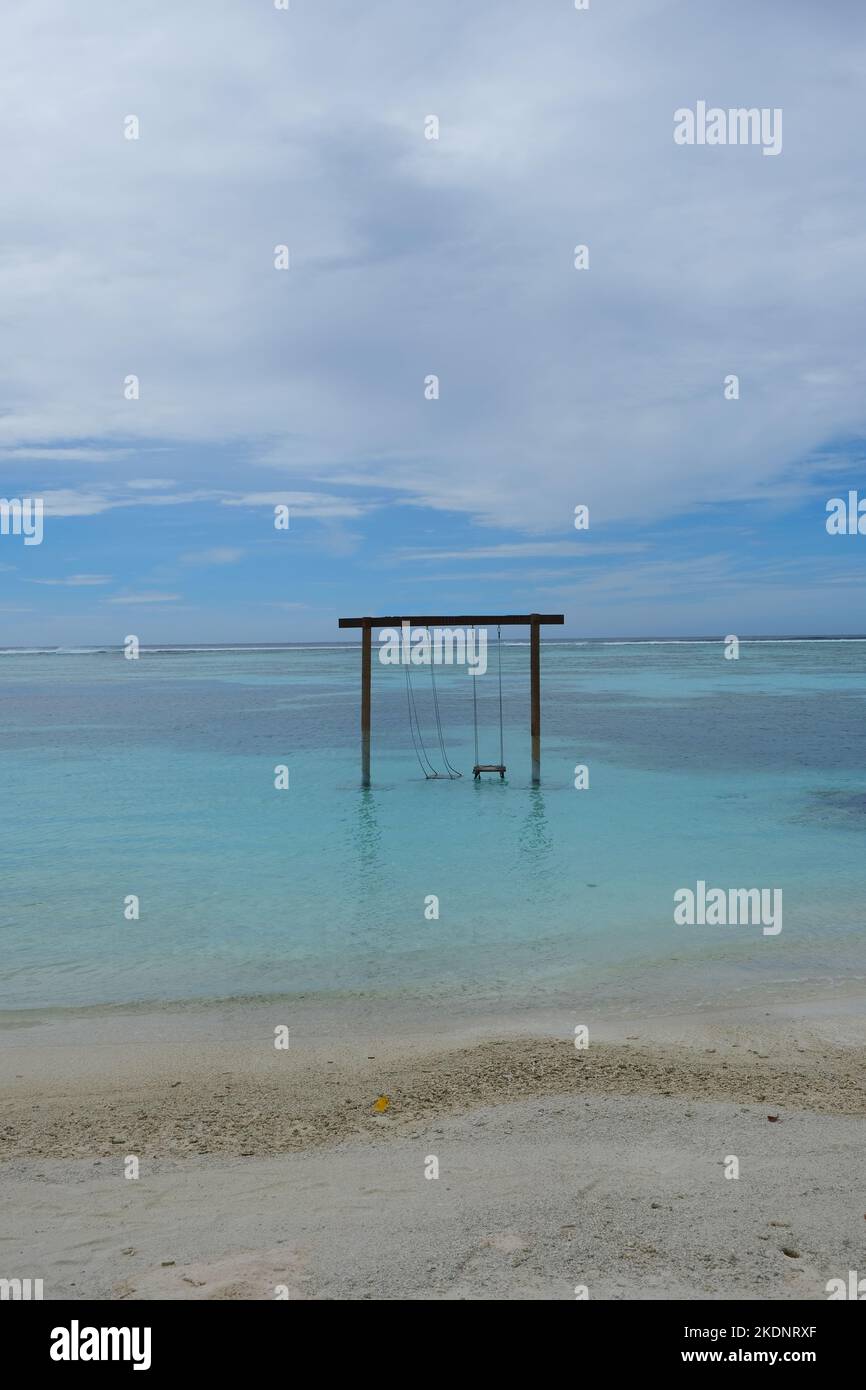 Beautiful swing with crystal clear water at Dhiffushi, Maldives Stock ...