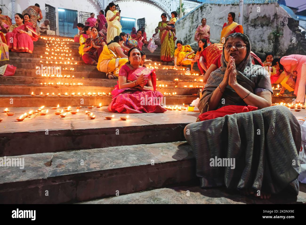 Female devotees offer prayers hi-res stock photography and images - Alamy