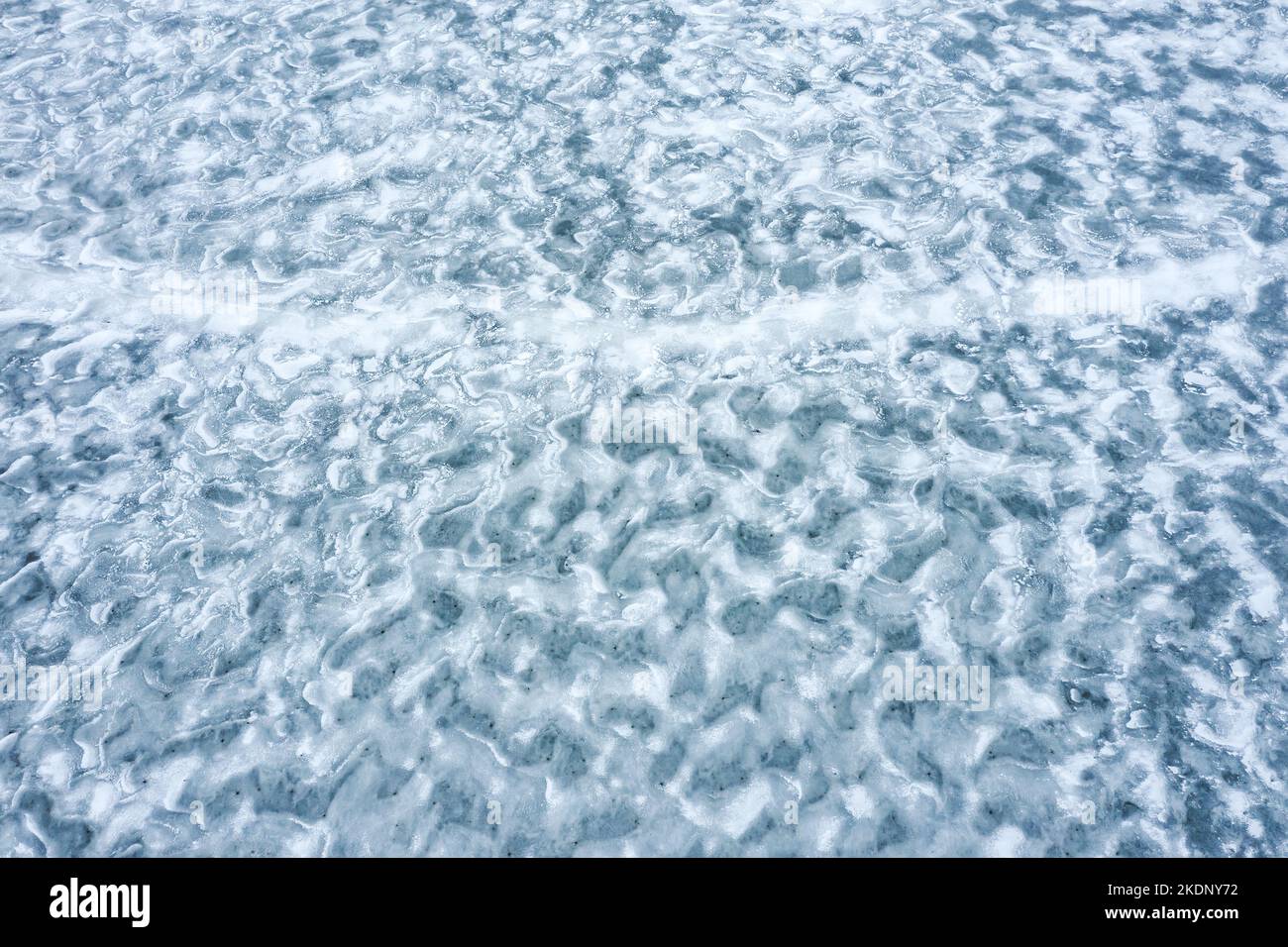 beautiful ice texture of frozen lake. natural winter background. aerial ...