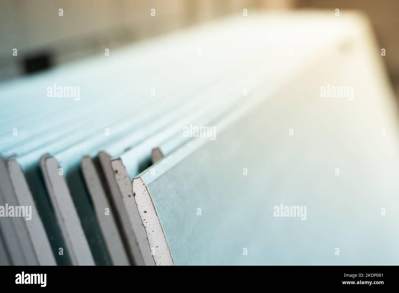 A lot of sheets of moisture-resistant drywall close-up at a ...