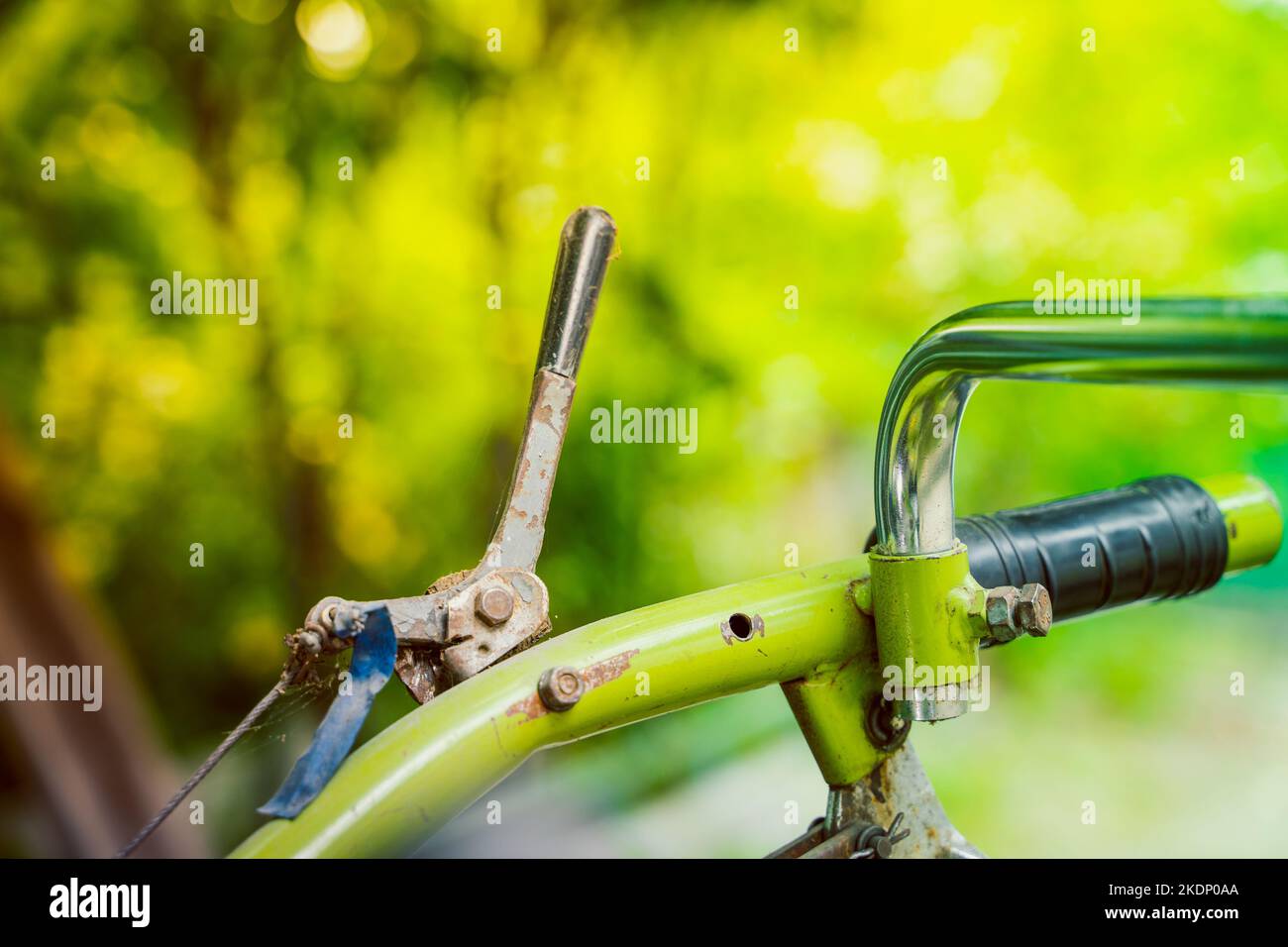 The lever for controlling the fuel supply to the engine on a walk ...