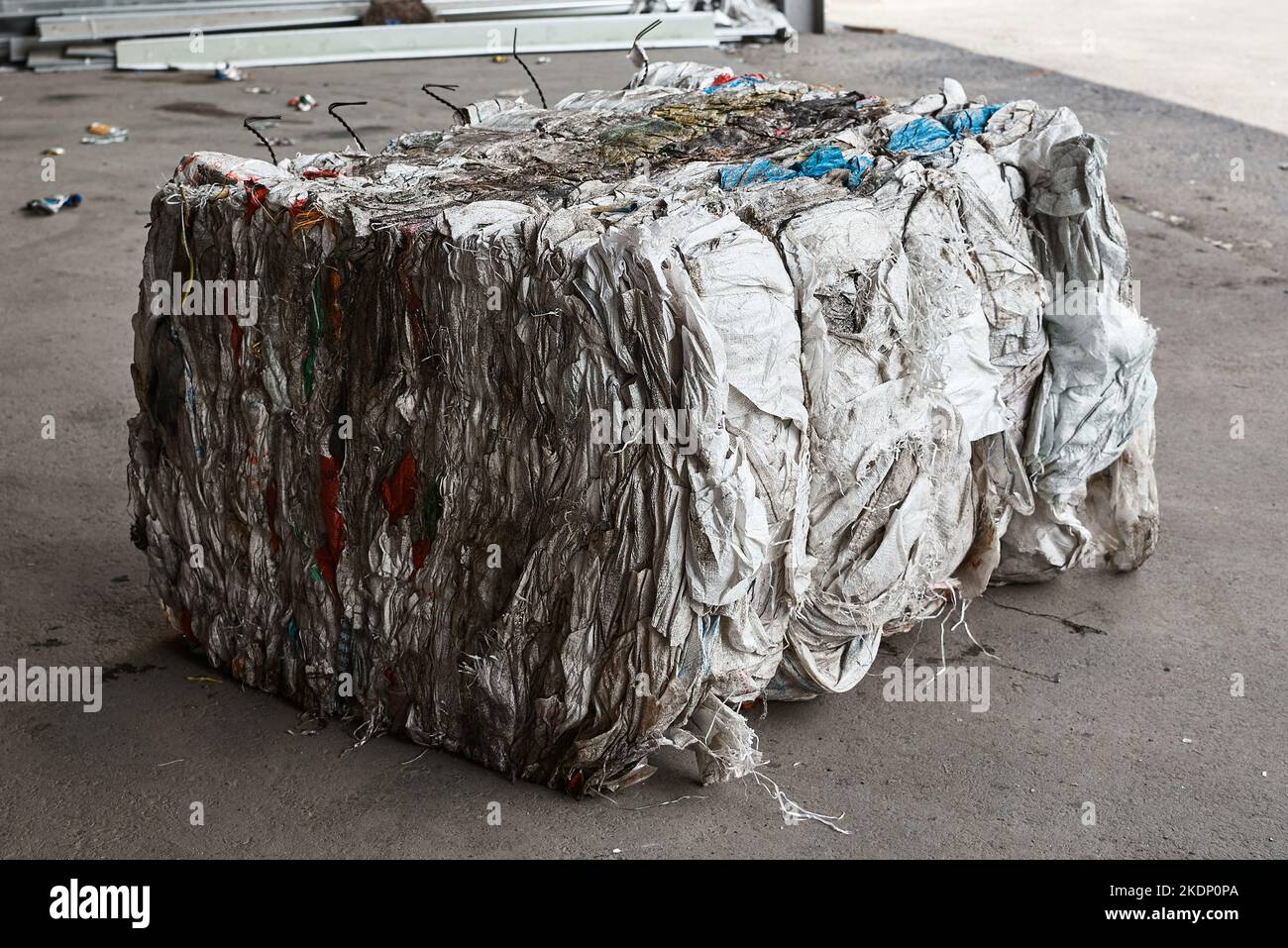 Block of pressed plastic material at recycling plant storage Stock ...