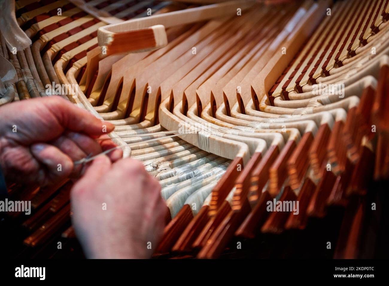 Worker wraps stator copper bus bars with insulation fabric Stock Photo ...
