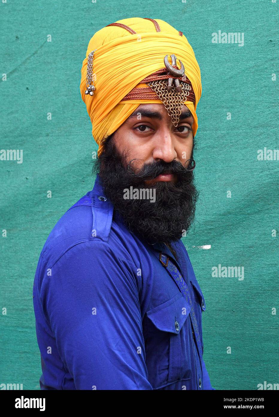 Nihang or Sikh warrior poses for a photo ahead of the birthday ...