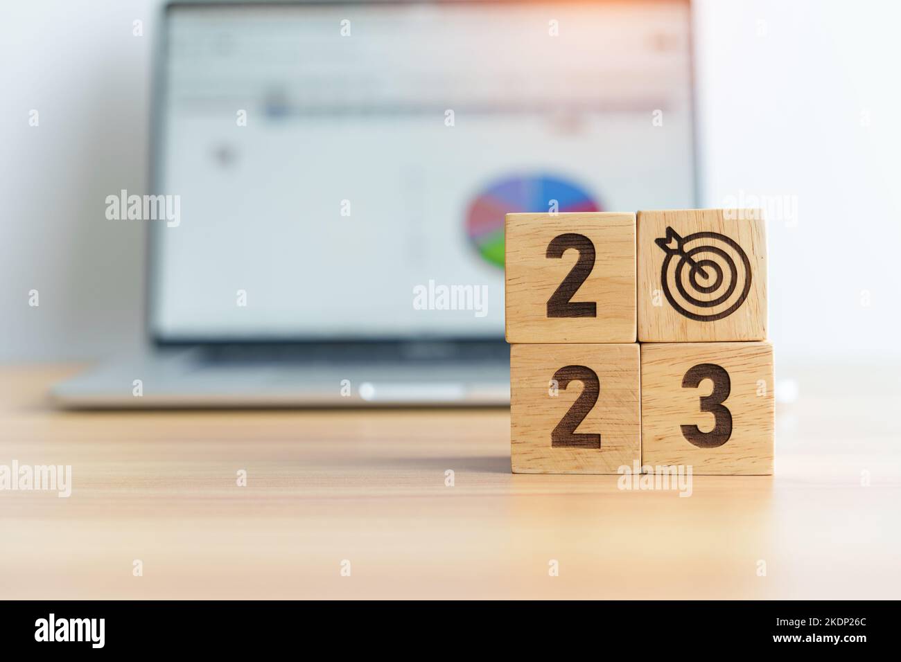 2023 Year block with dartboard icon against computer laptop background. Goal, Target, Resolution ...