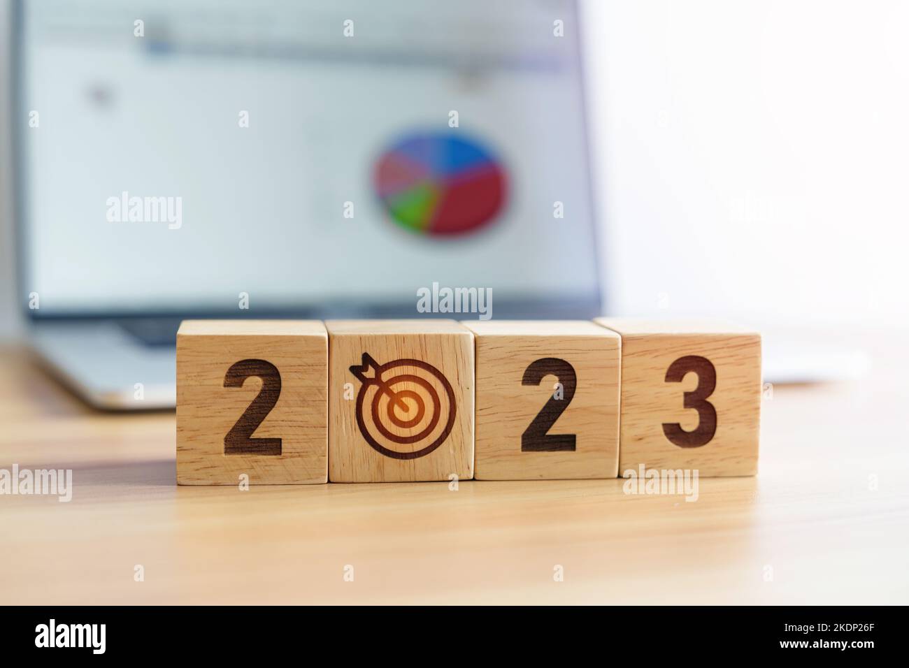 2023 Year block with dartboard icon against computer laptop background. Goal, Target, Resolution ...