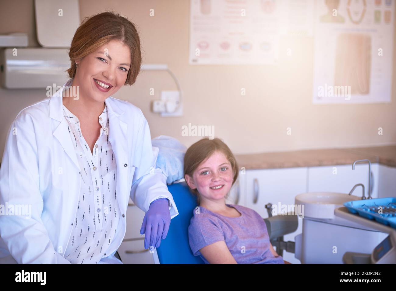 I help build healthy and strong teeth. a female dentist attending to ...