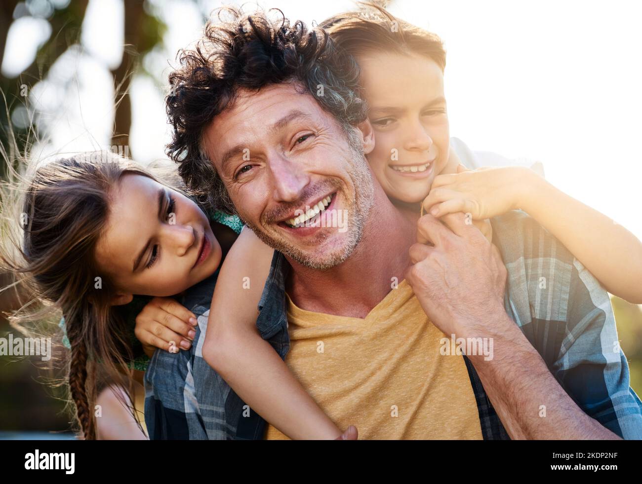 Hes doing a great job raising his kids. Portrait of a happy father ...