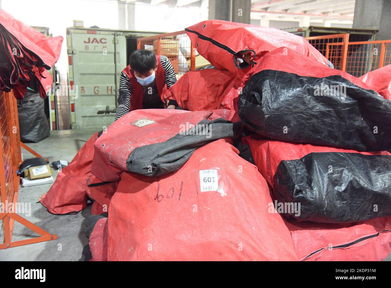 LIANYUNGANG, CHINA - NOVEMBER 8, 2022 - Employees of YTO Express sort ...