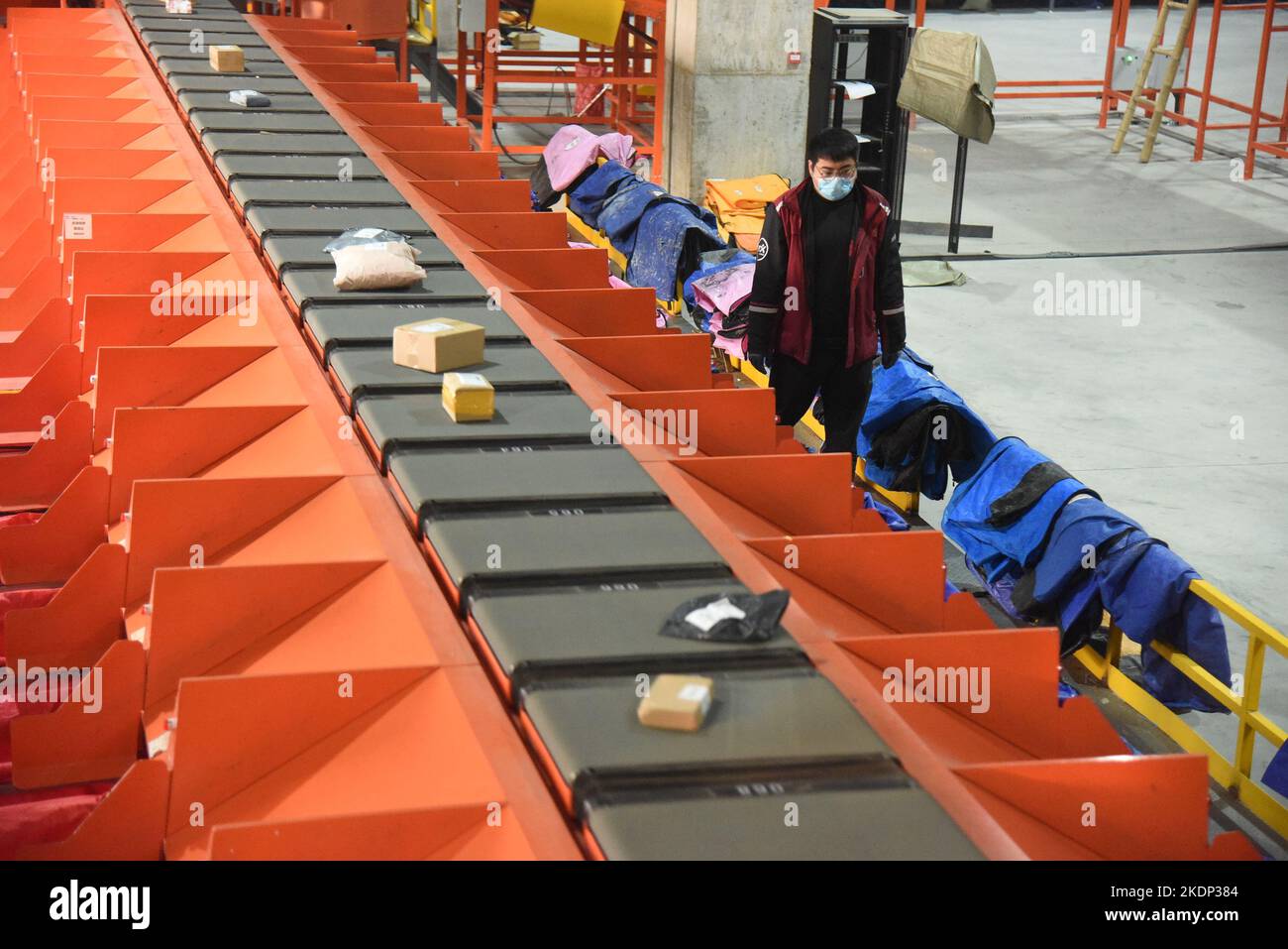 LIANYUNGANG, CHINA - NOVEMBER 8, 2022 - Employees of YTO Express sort ...