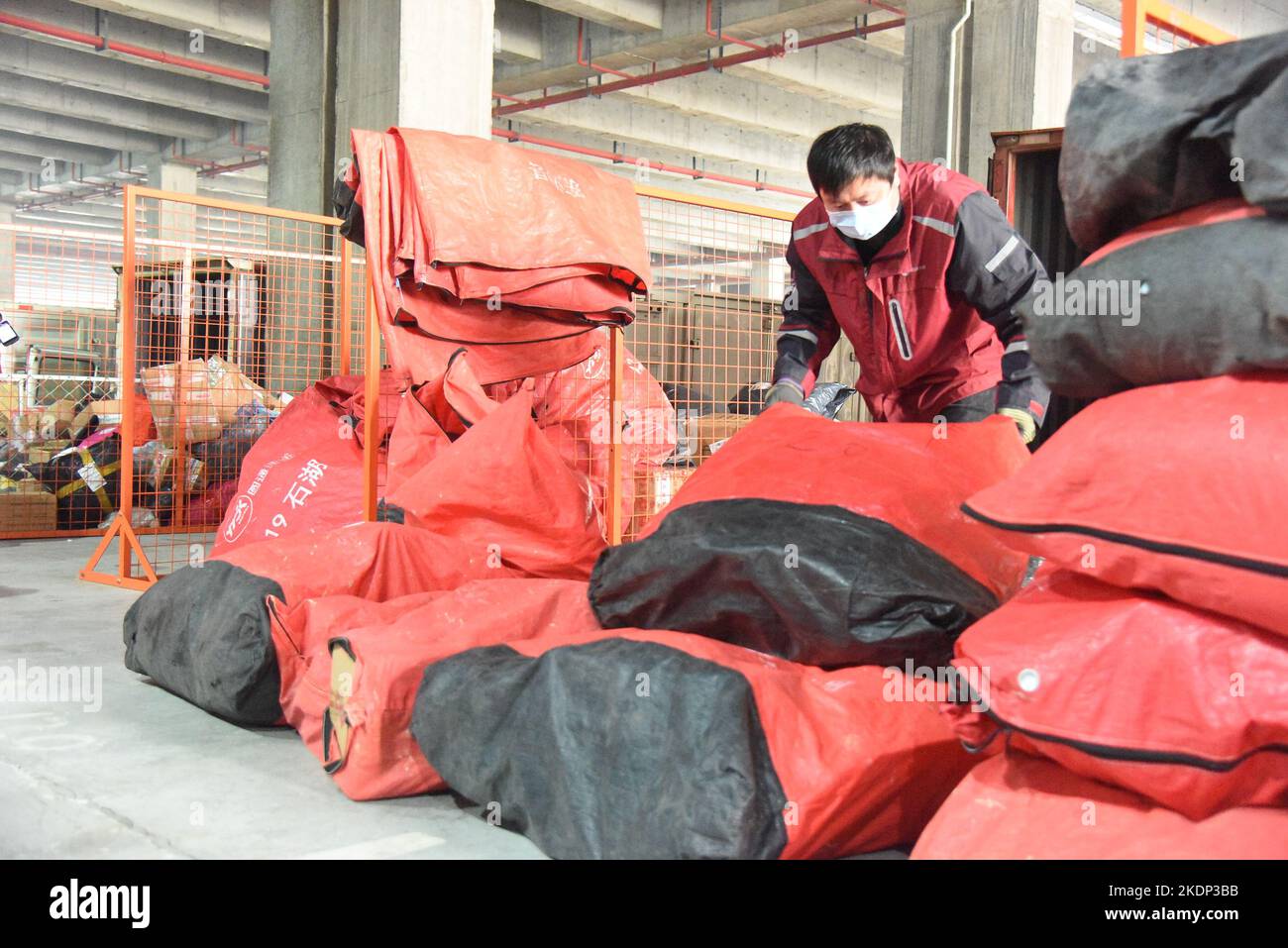 LIANYUNGANG, CHINA - NOVEMBER 8, 2022 - Employees of YTO Express sort ...