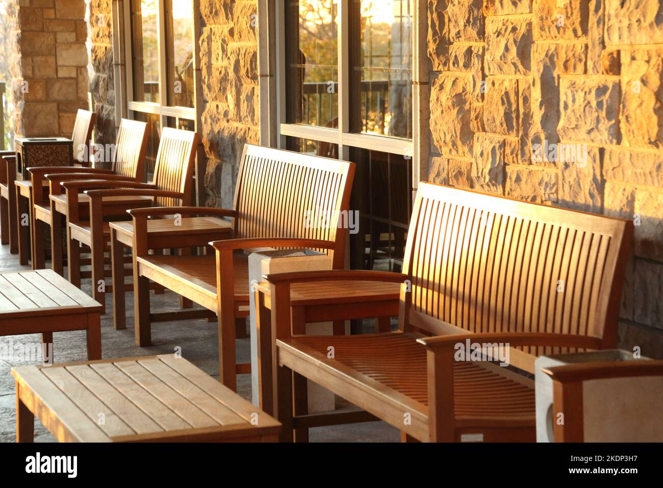 Row of benches on a patio Stock Photo - Alamy