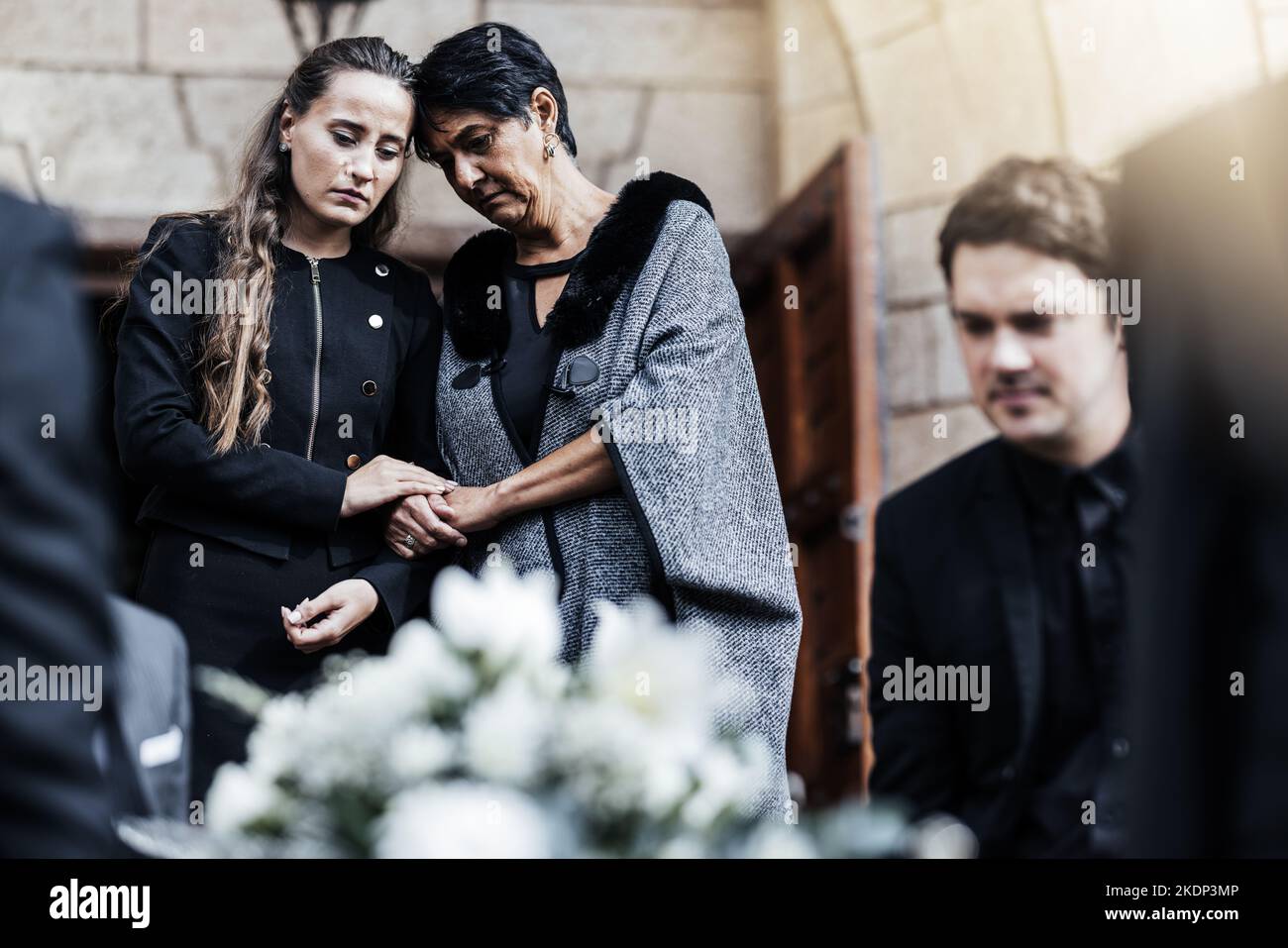 Funeral, senior mother and woman sad, crying and death in family ...