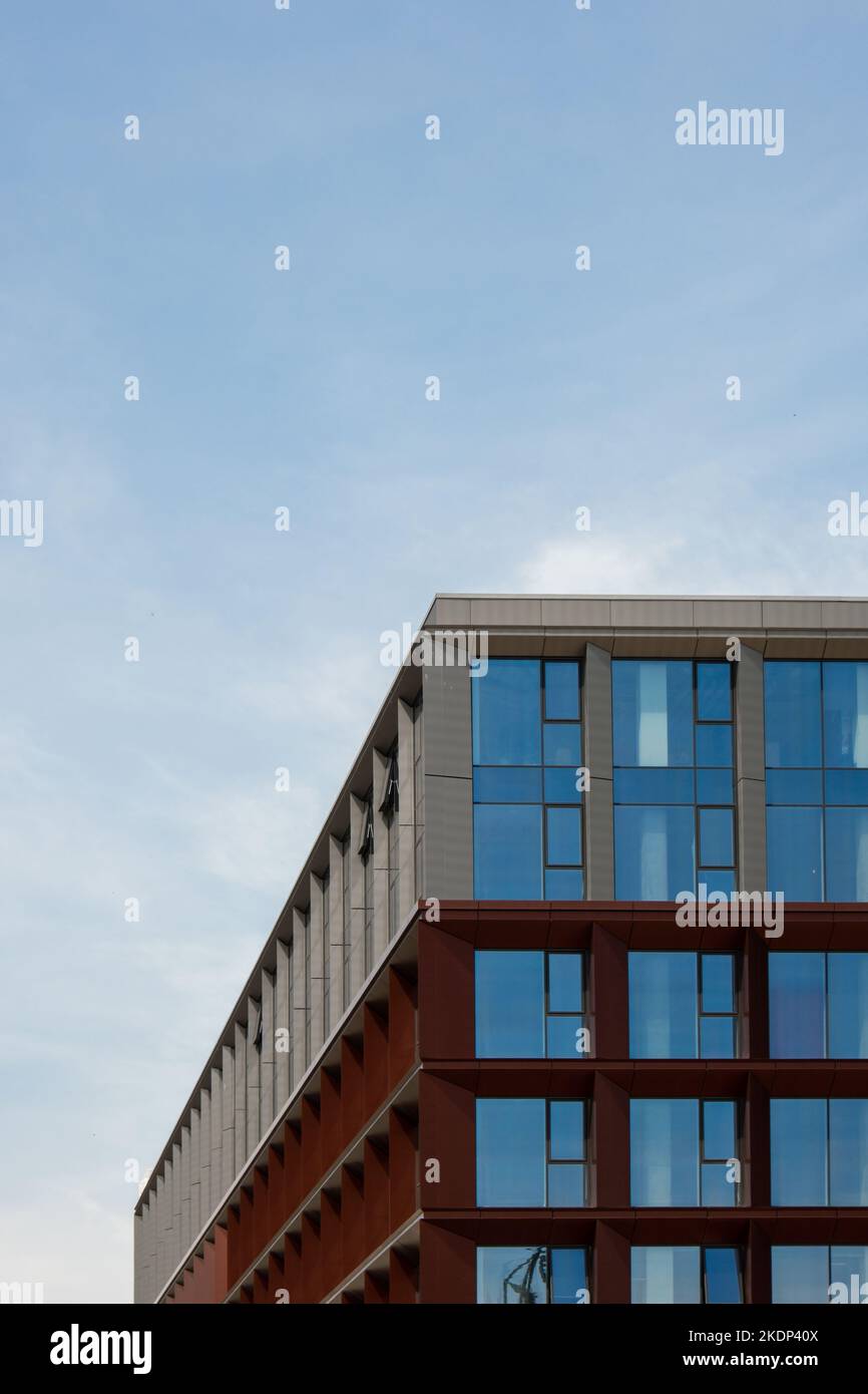 Modern office building exterior with glass facade on clear sky ...