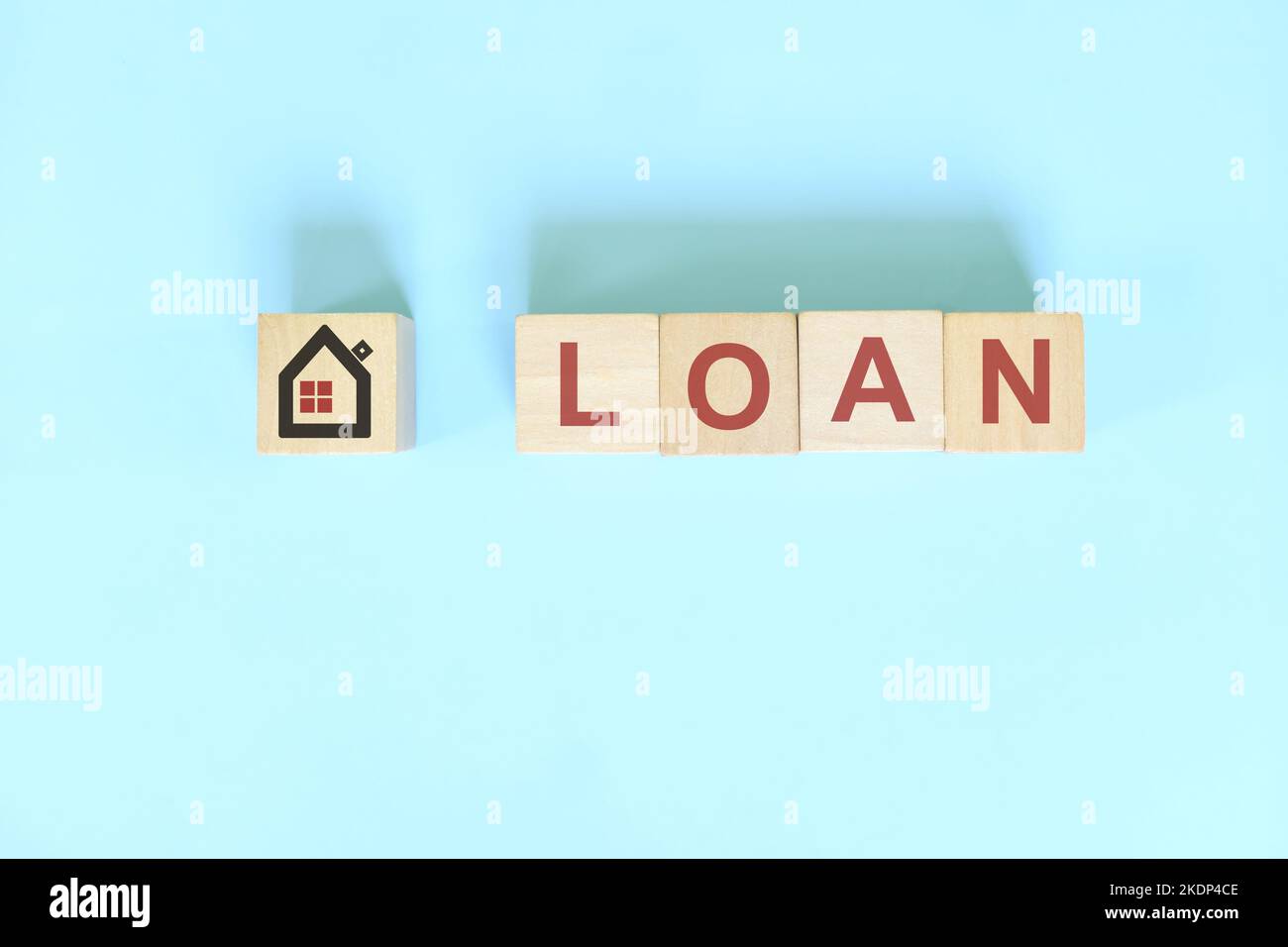 Housing and property mortgage loan concept in real estate. Wooden ...