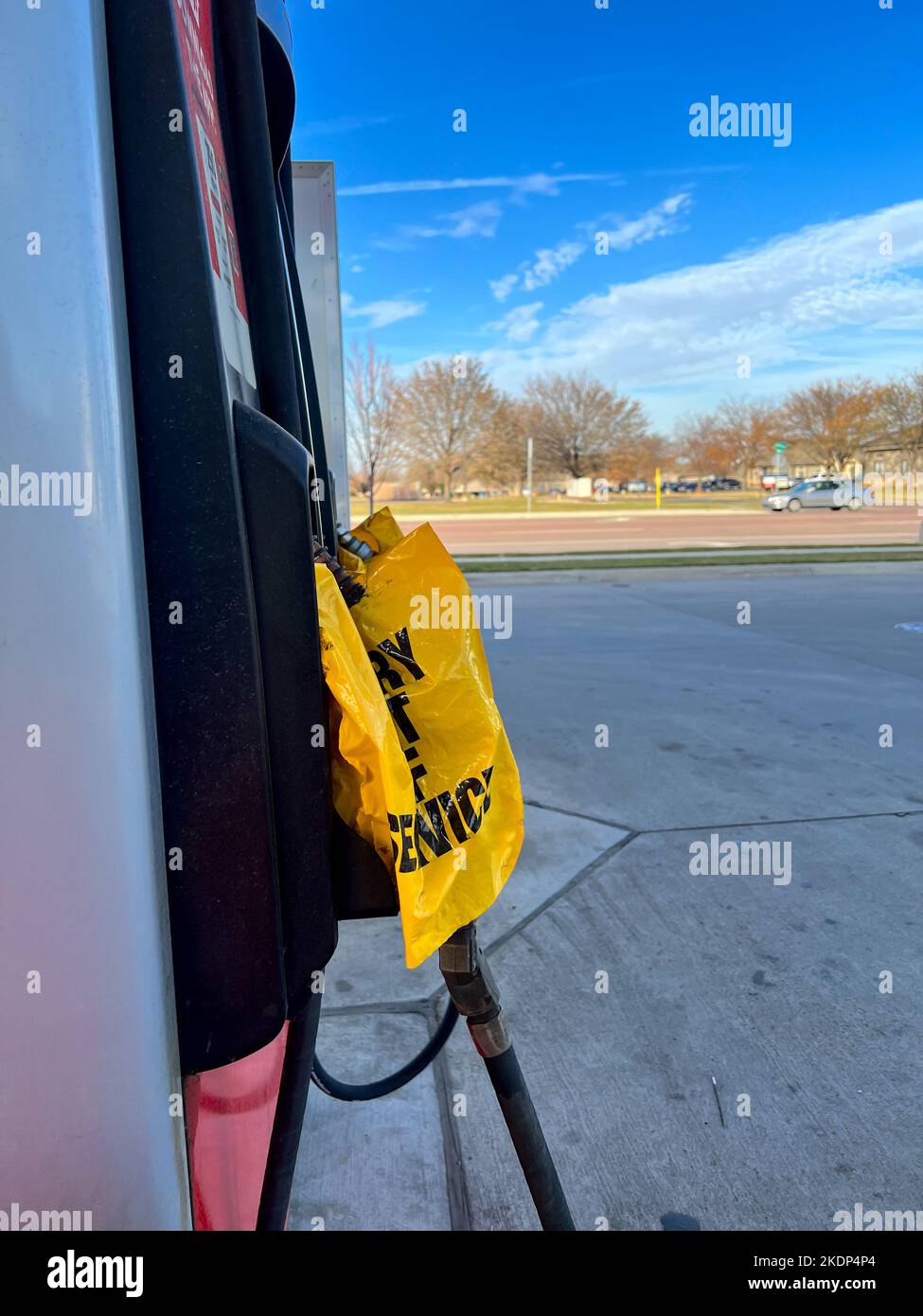 Bag with wording posting - Out of Service - over a gas station service ...