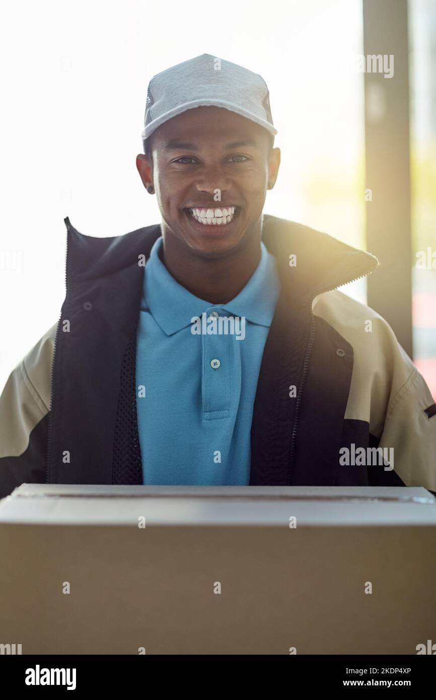 Quick and convenient delivery is our motto. Portrait of a courier ...