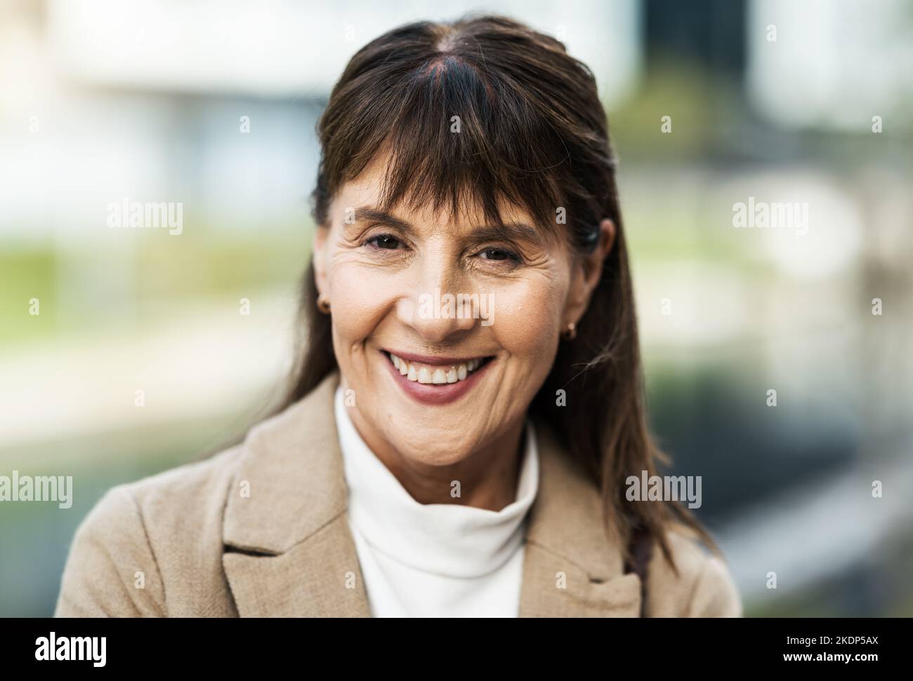 Senior woman, face and smile for vision, ambition or career success in ...